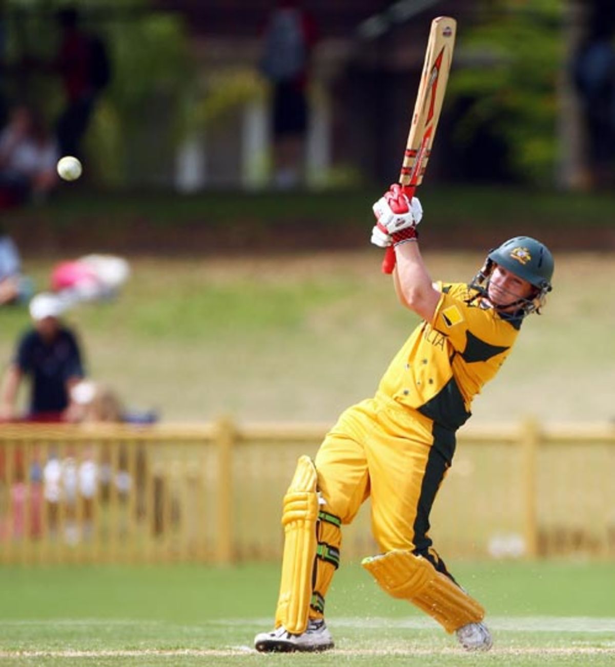 Karen Rolton raises her bat on reaching her half-century | ESPNcricinfo.com
