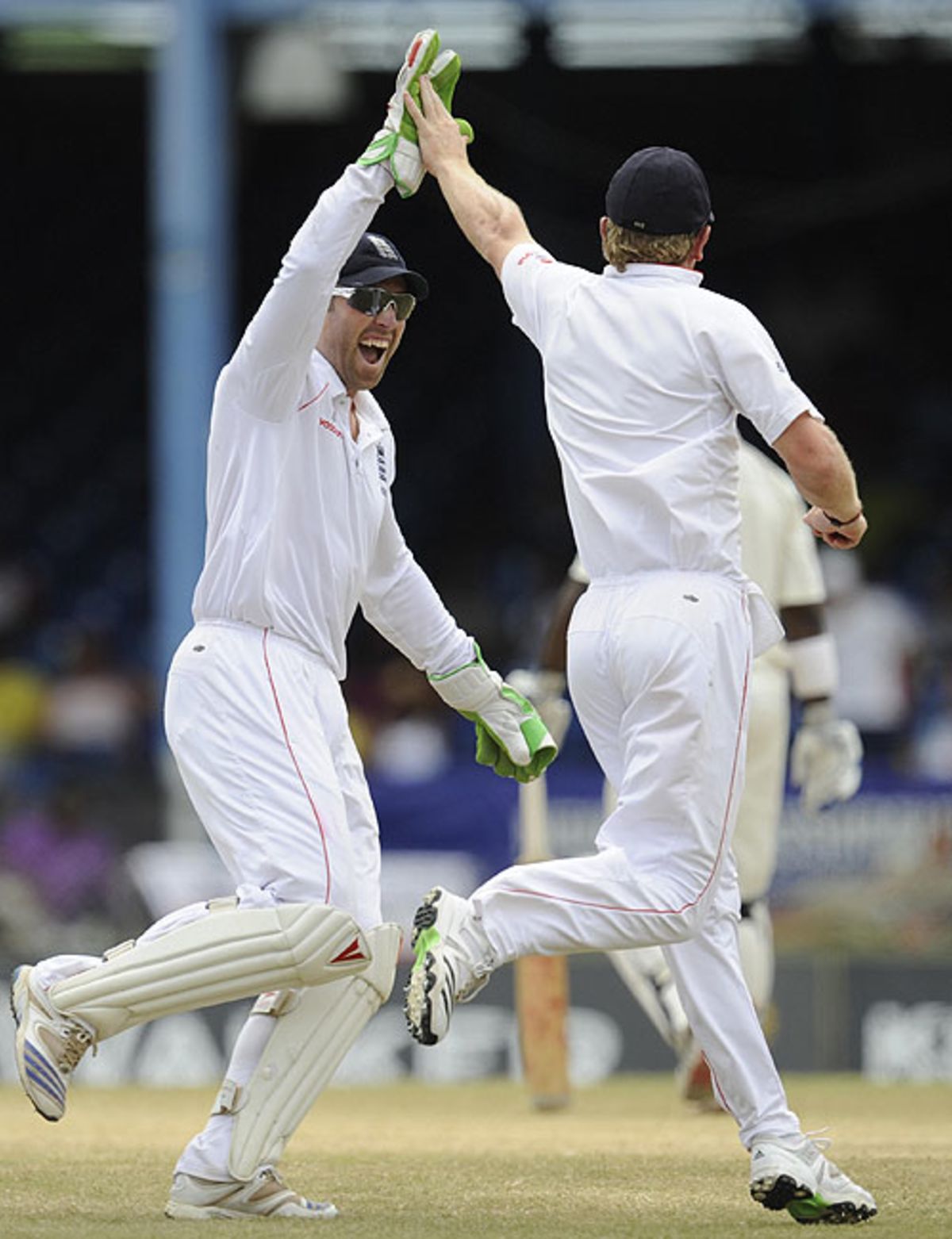 Matt Prior and Paul Collingwood celebrate the removal of Lendl Simmons ...