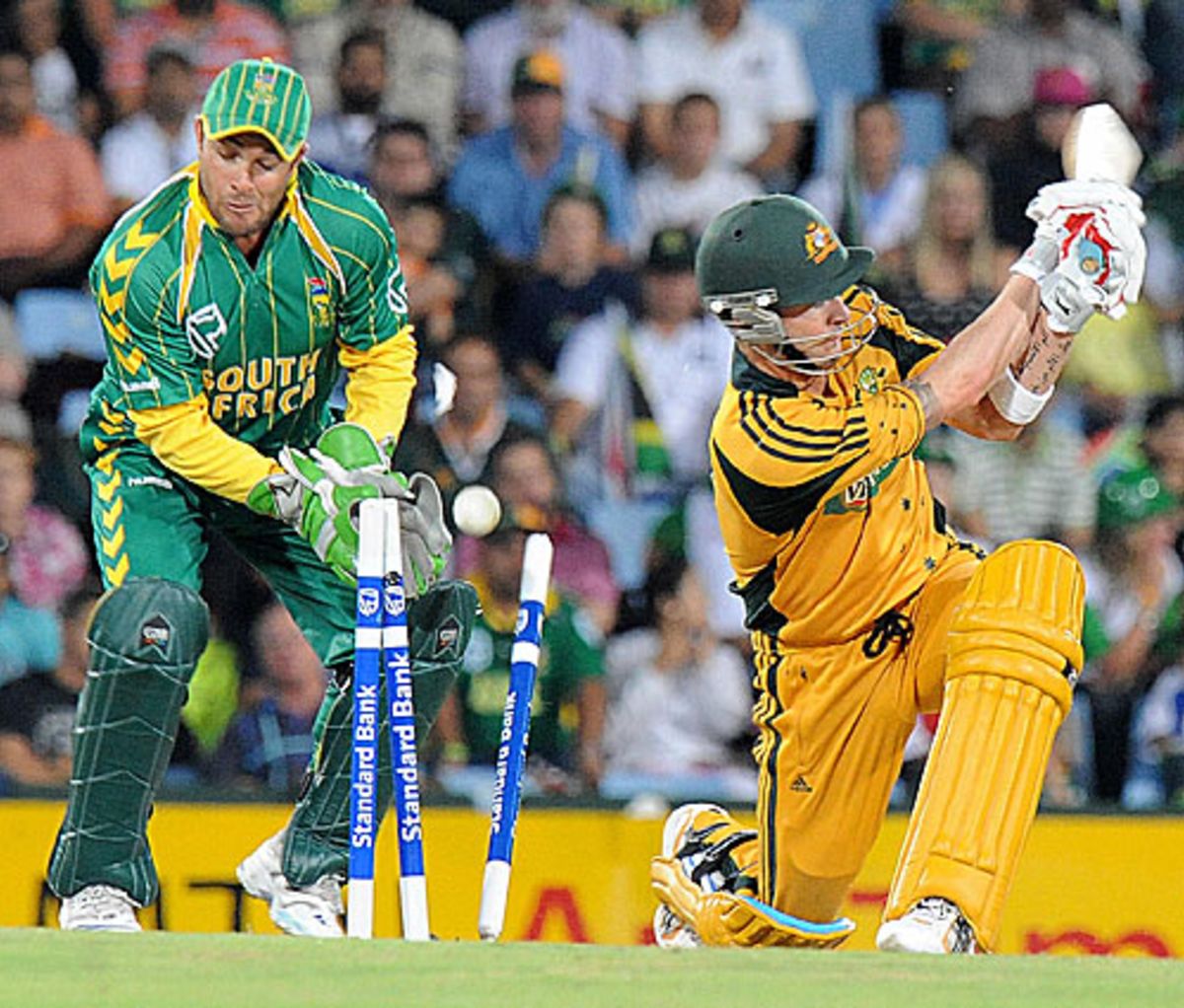 Michael Clarke sweeps and his leg stump is knocked out cold by Johan ...