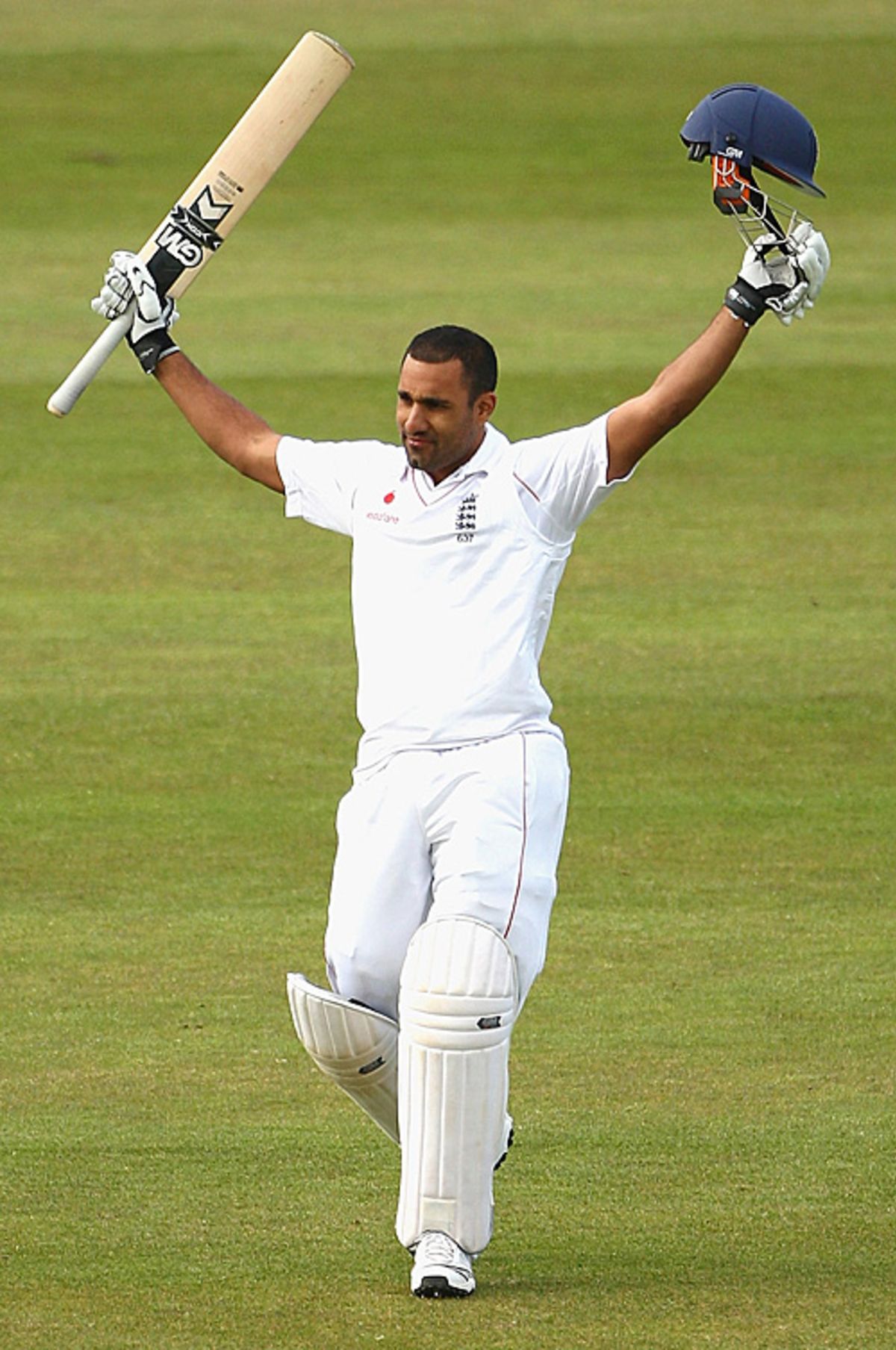 Ravi Bopara lofts his arms on reaching his third successive Test ...
