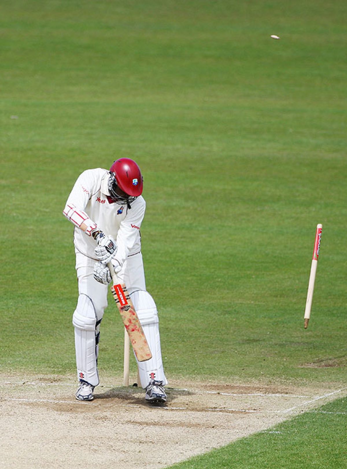 Jerome Taylor's off stump is sent cartwheeling by James Anderson ...
