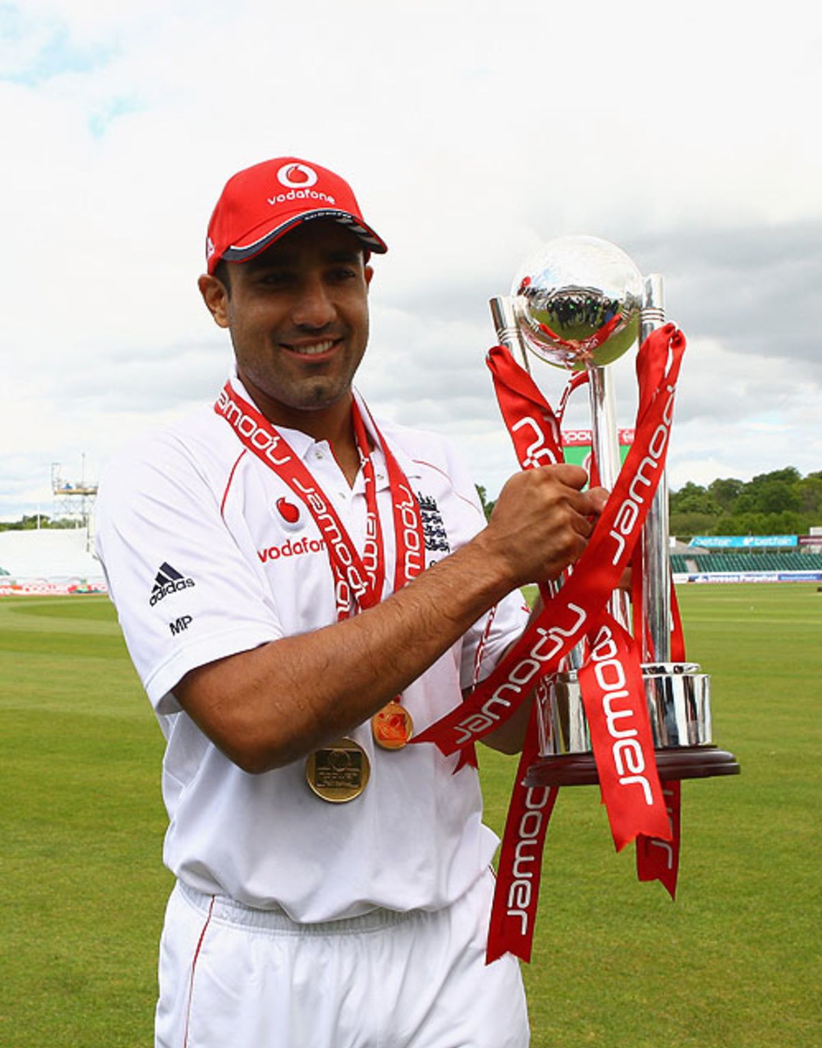 Man of the Series Ravi Bopara poses with the trophy after England's 2-0 ...