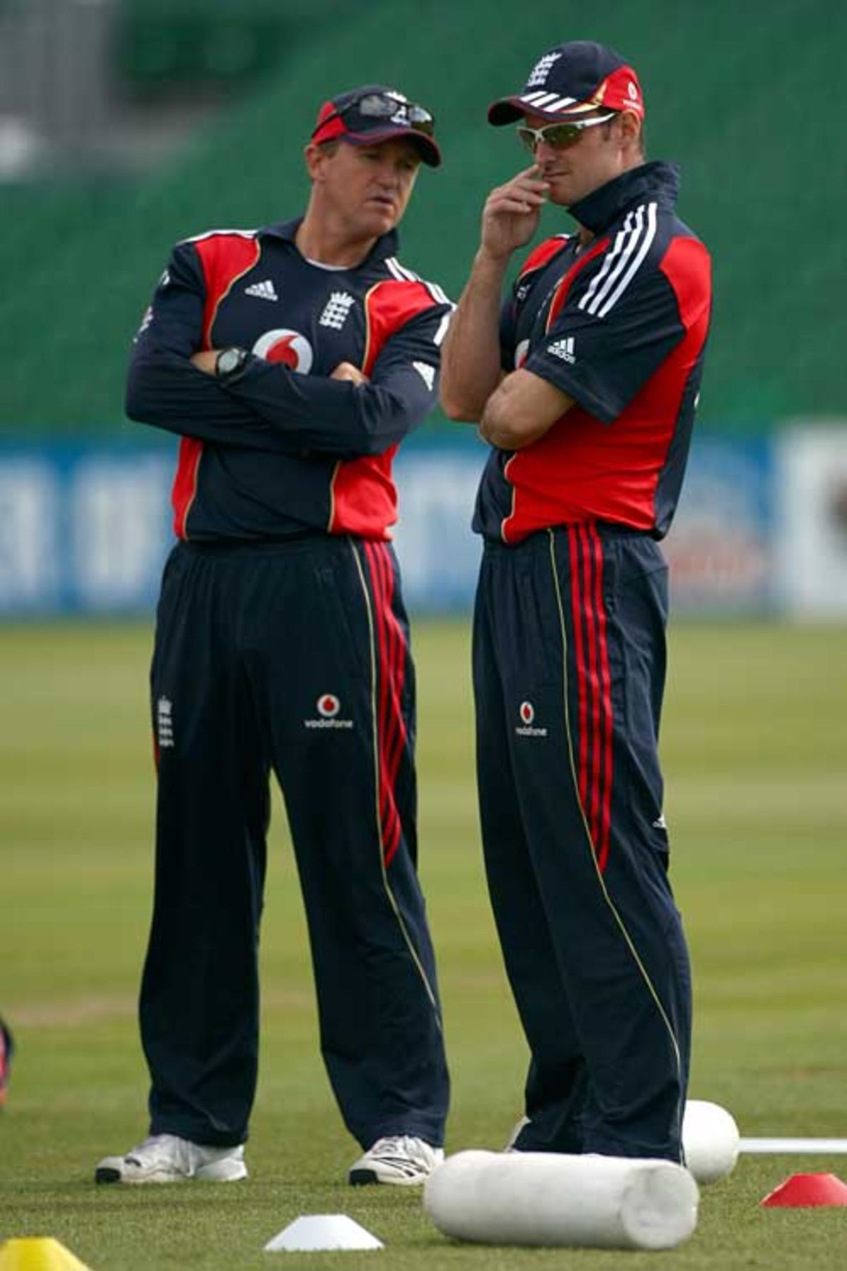 Andy Flower and Andrew Strauss discuss tactics during practice ...