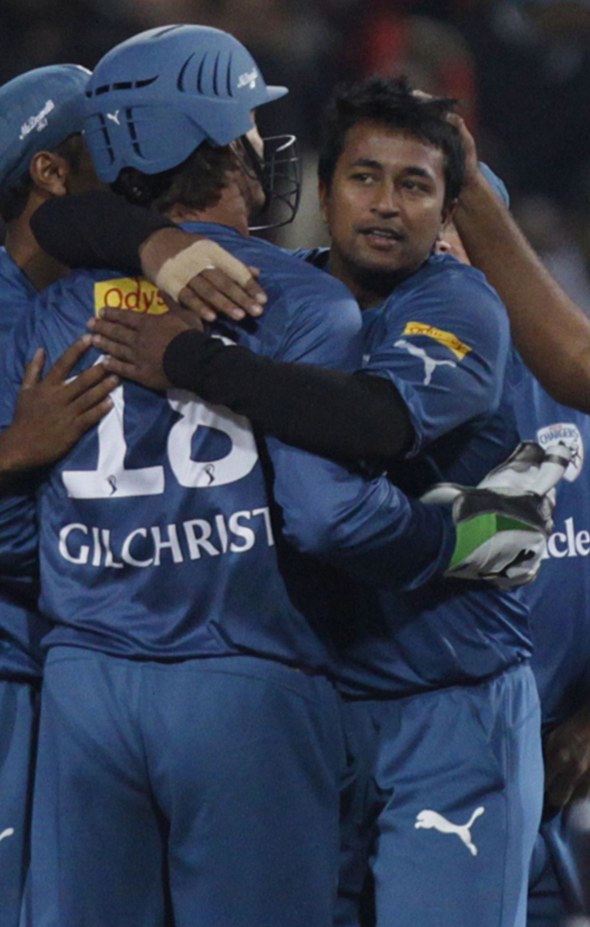Pragyan Ojha gets the congratulations after dismissing Praveen Kumar ...