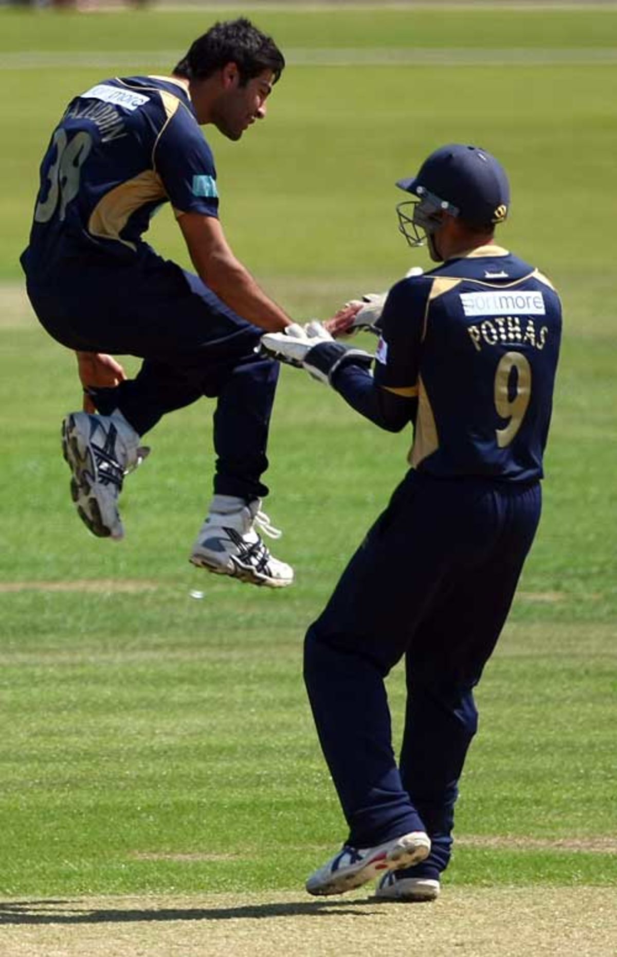 Hamza Riazuddin celebrates one of his three wickets | ESPNcricinfo.com