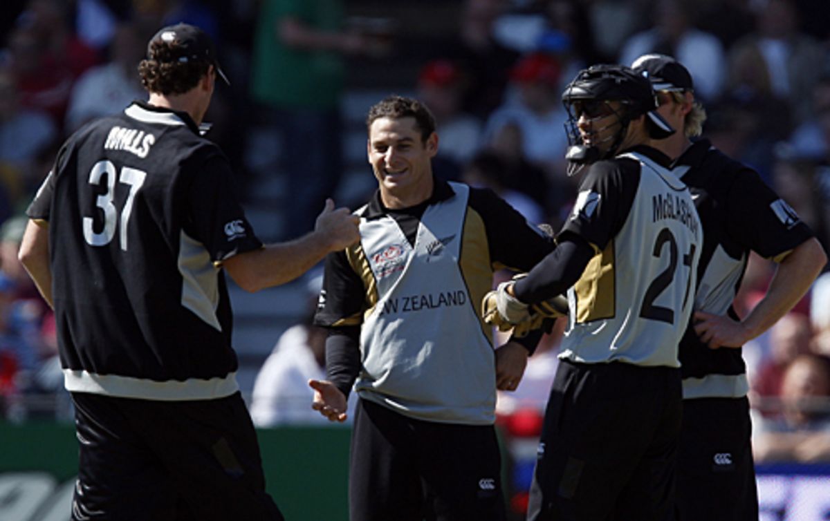 Nathan McCullum is congratulated after removing Alex Cusack ...