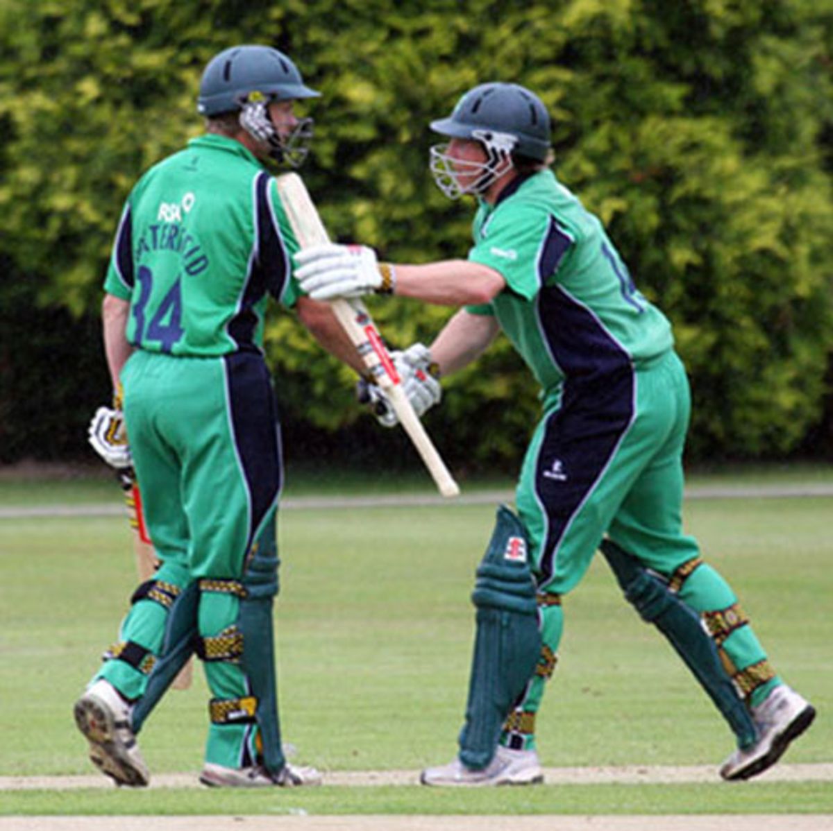 Gary Wilson and William Porterfield celebrate their hundred partnership ...