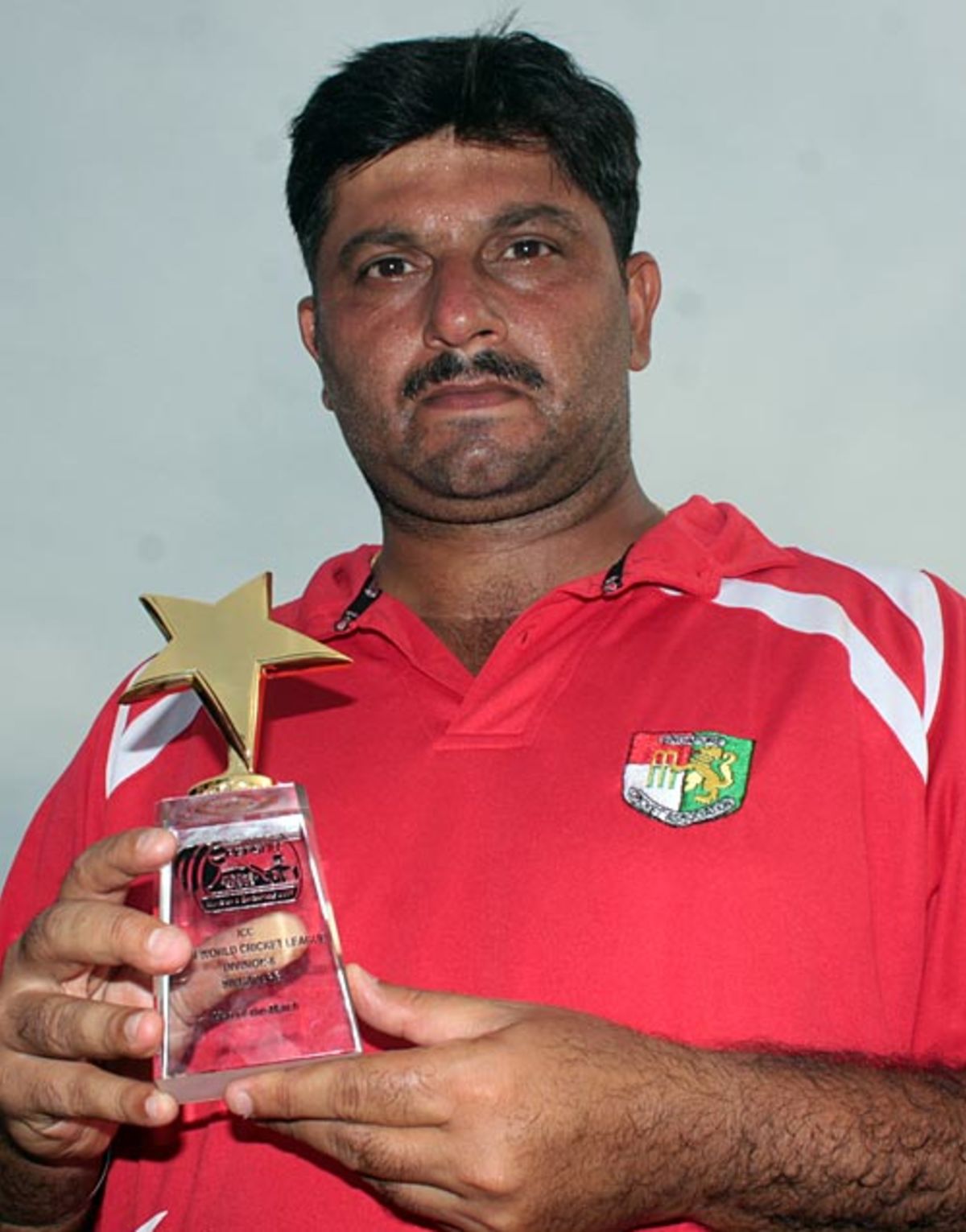 Chetan Suryawanshi, the Singapore captain, with the trophy ... Chetan Suryawanshi, the Singapore captain, with the trophy ...