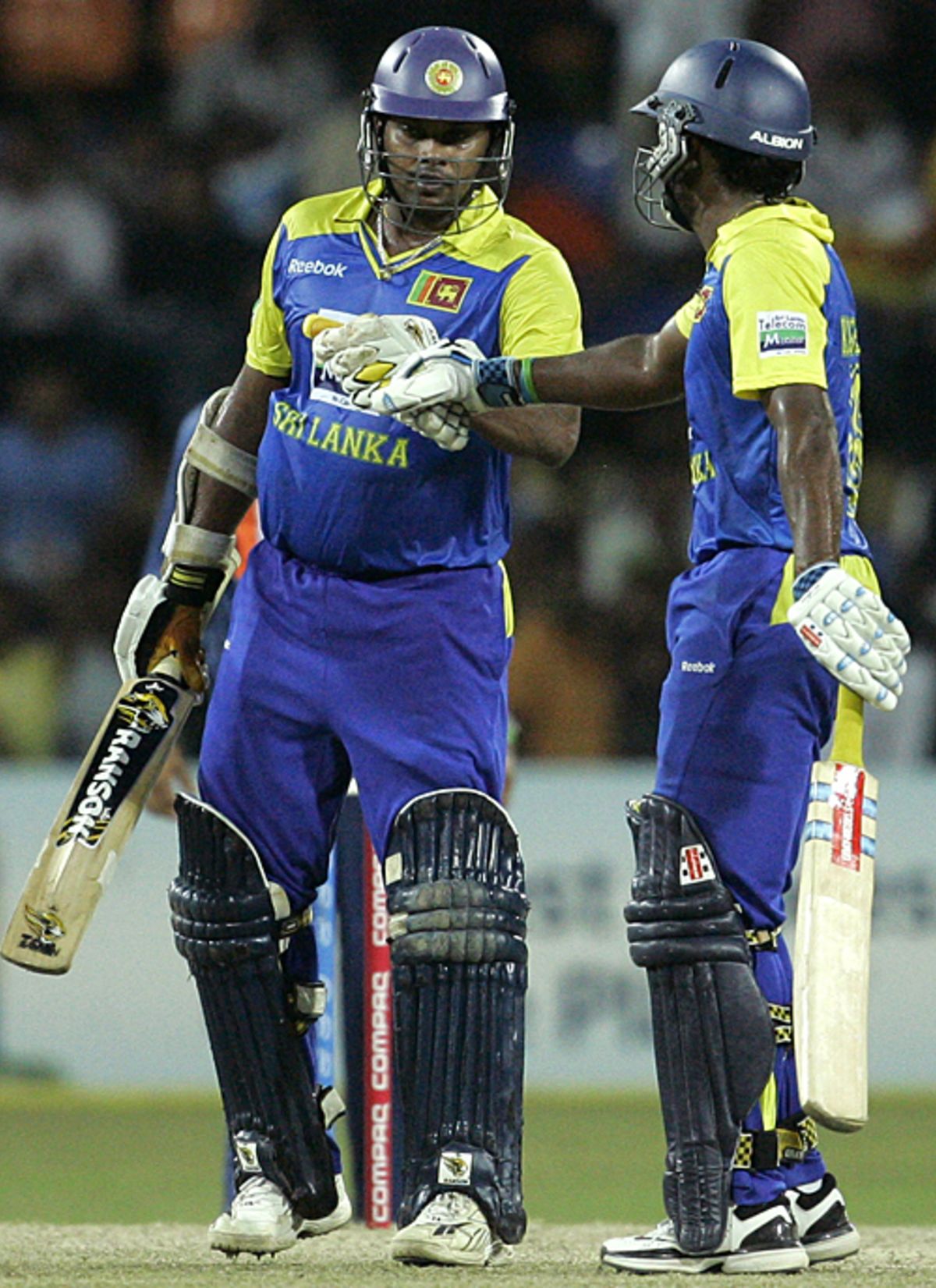 Chamara Kapugedera congratulates Thilina Kandamby on getting to fifty ...