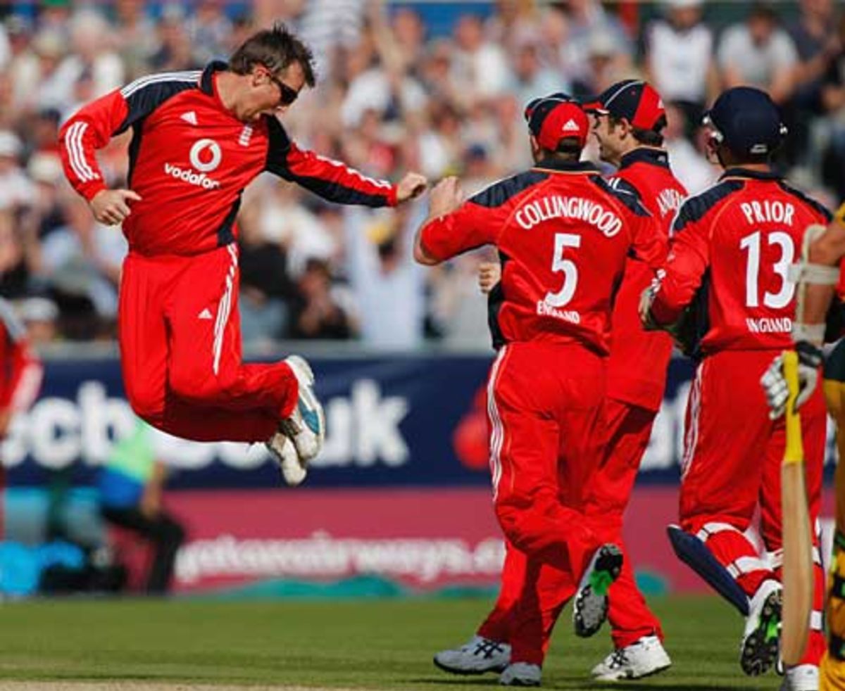 Graeme Swann celebrates his fifth wicket after bowling Brett Lee ...