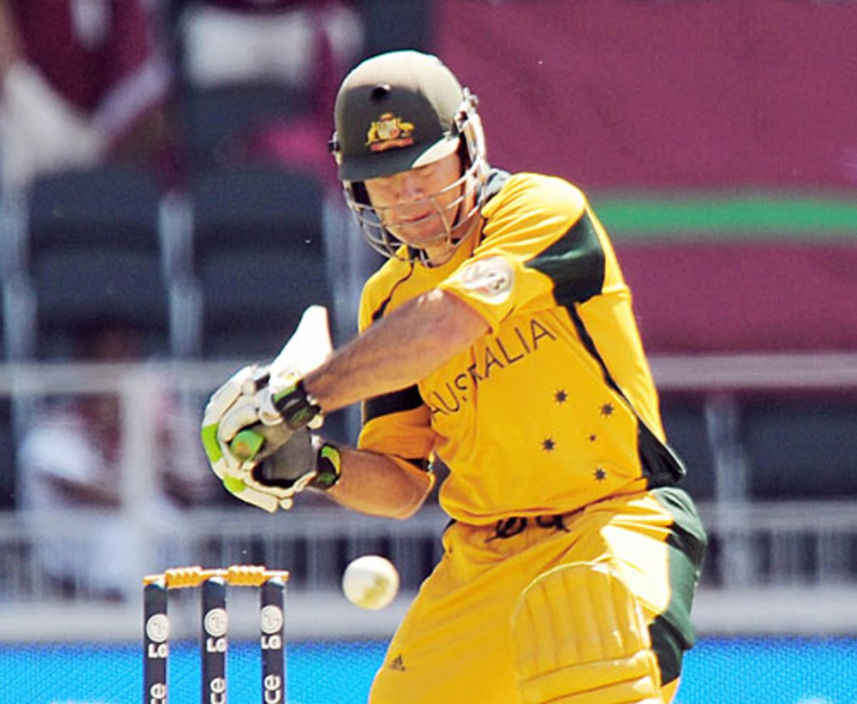 Ricky Ponting raises the bat after getting his half-century ...