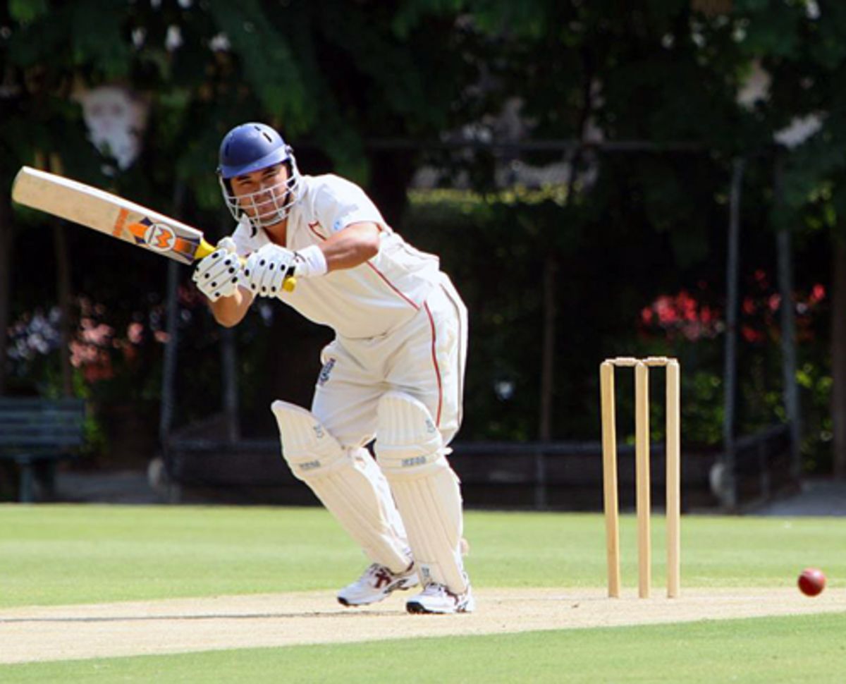 Roy Lamsam hits the ball through mid-wicket | ESPNcricinfo.com