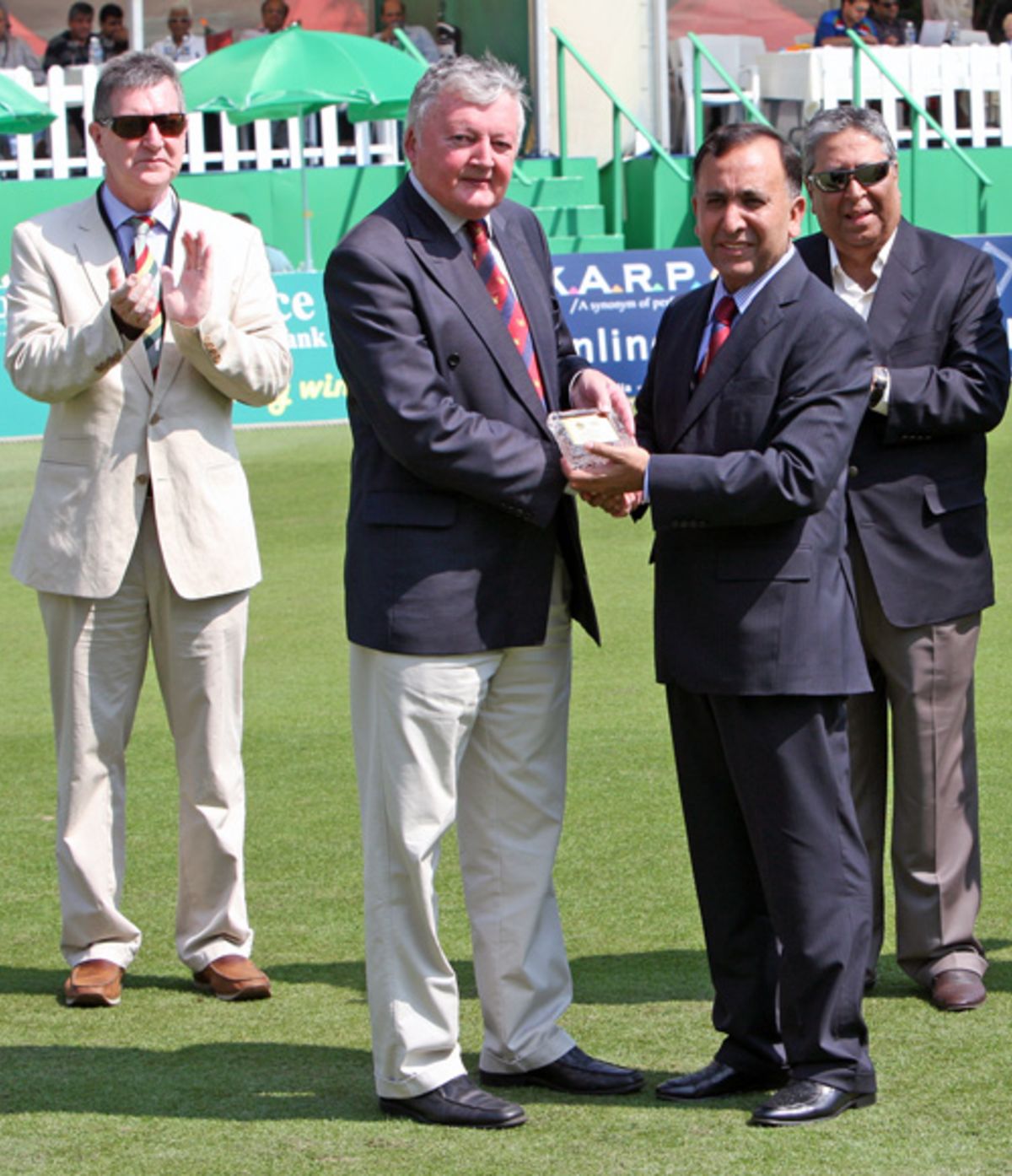 Papu Butani is presented with his HKCA Honorary Life Member Award by ...