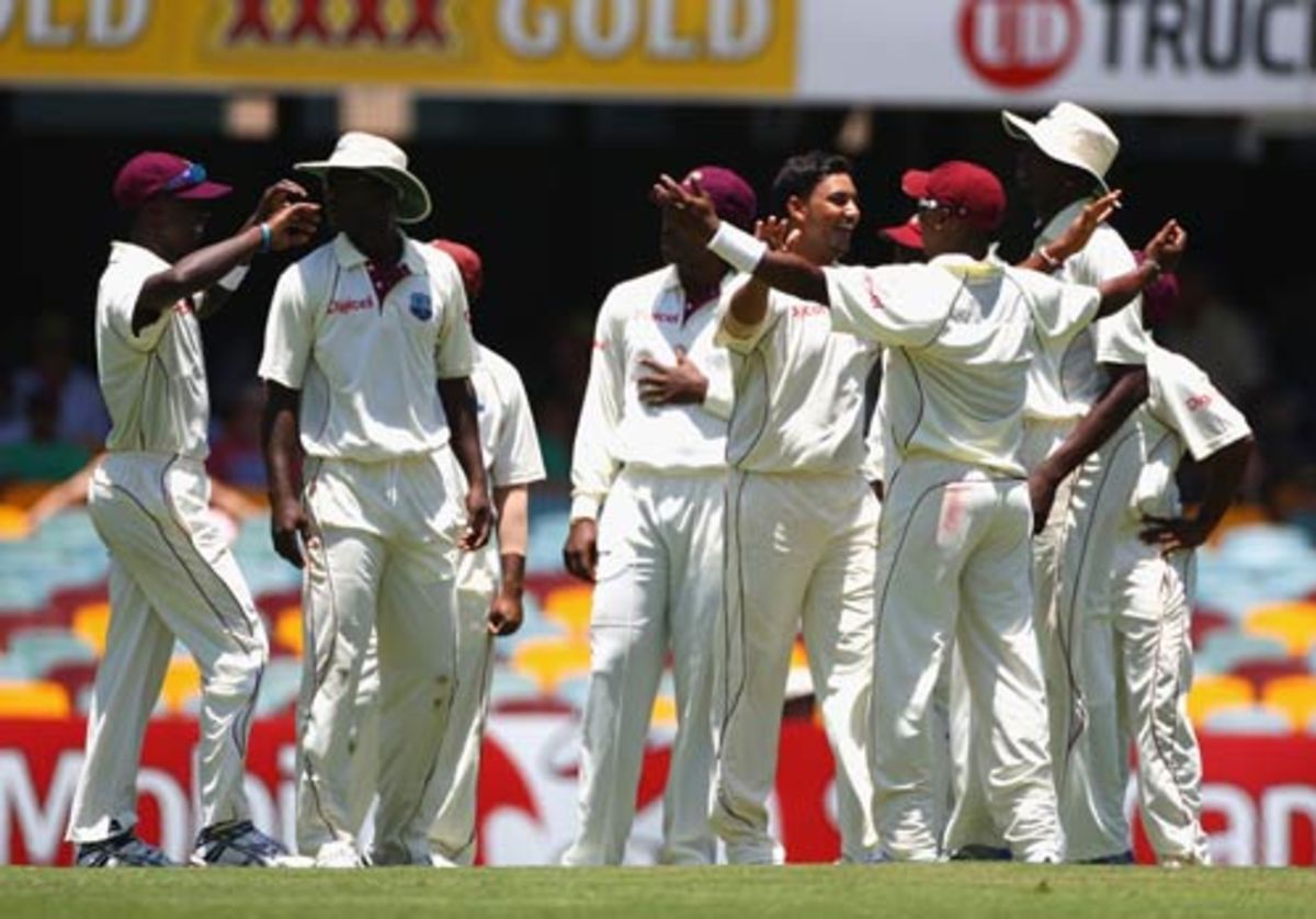 The West Indies players congratulate Ravi Rampaul on his first Test ...