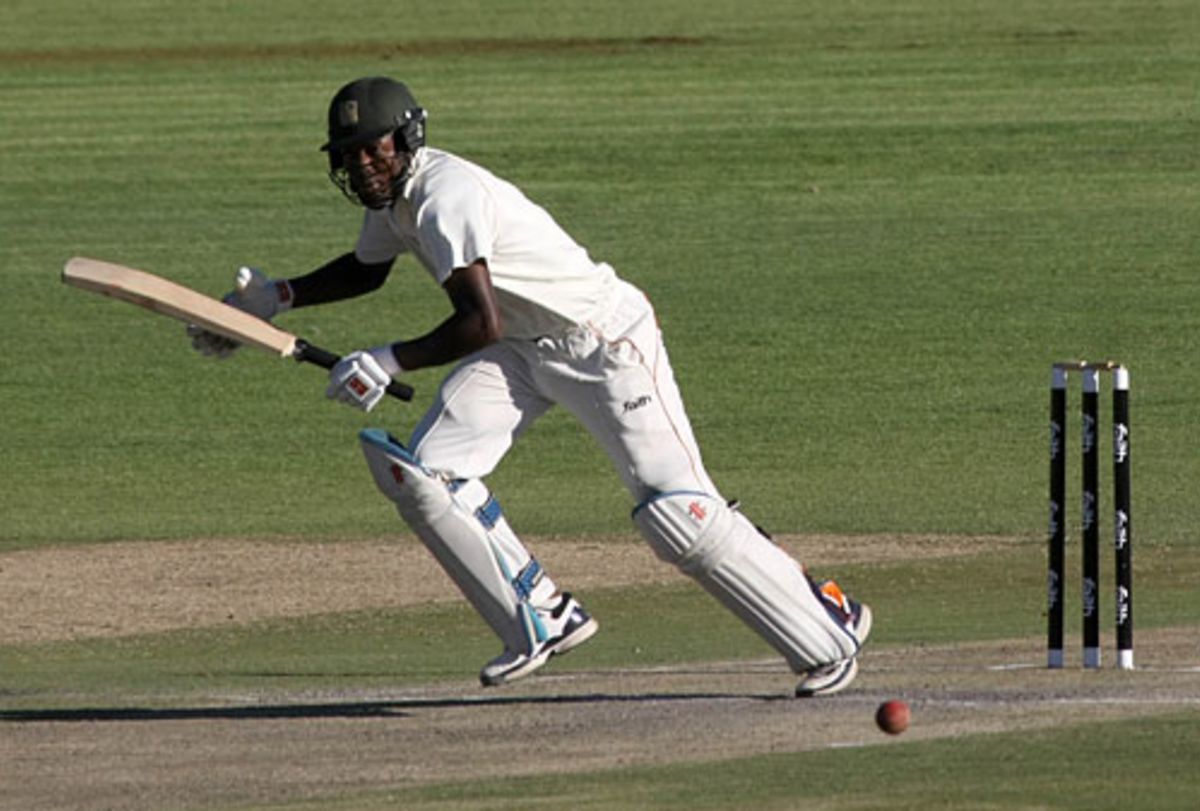 Foster Mutizwa celebrates reaching his hundred for the Mashonaland ...