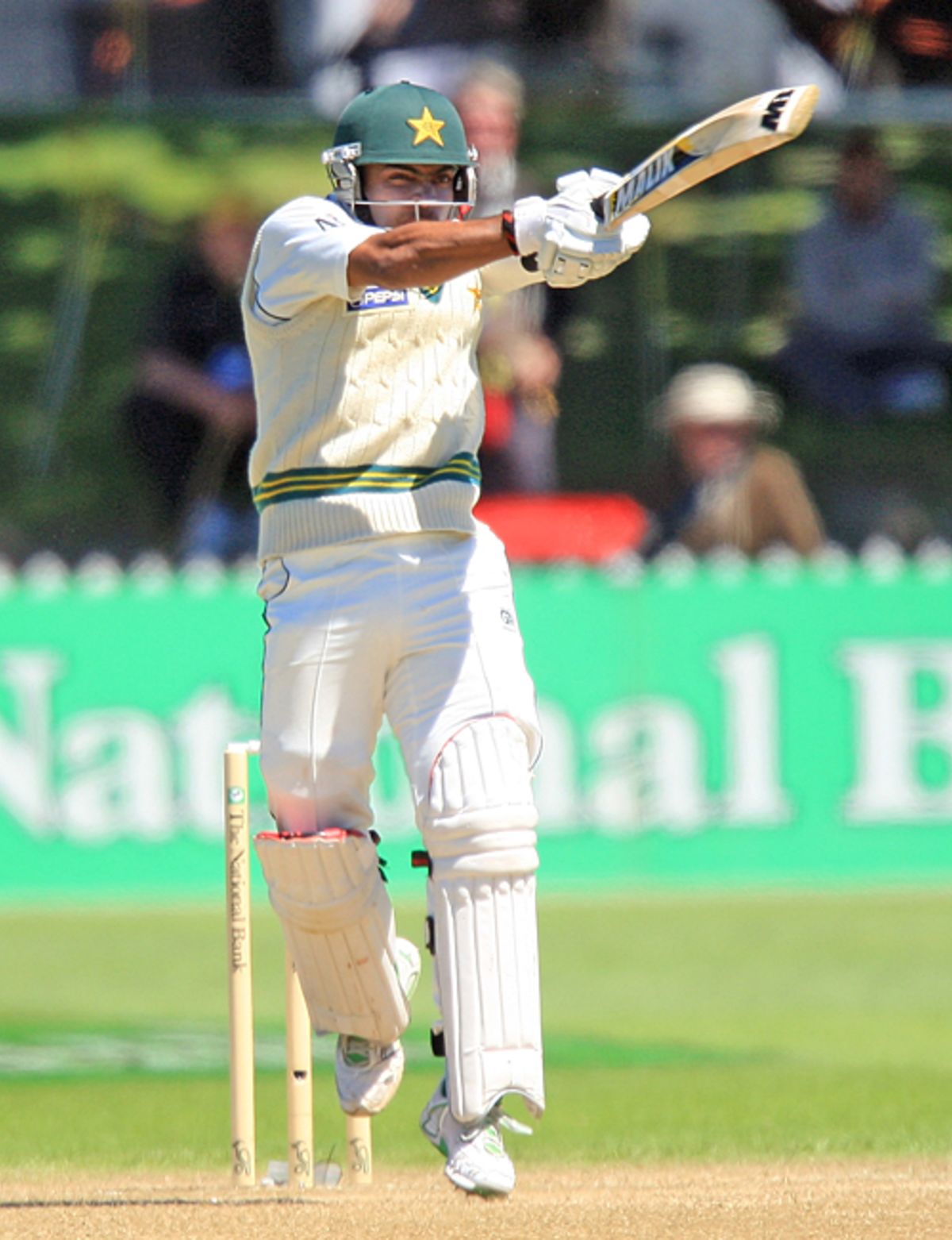 Daniel Vettori took a good running catch to dismiss Umar Akmal ...