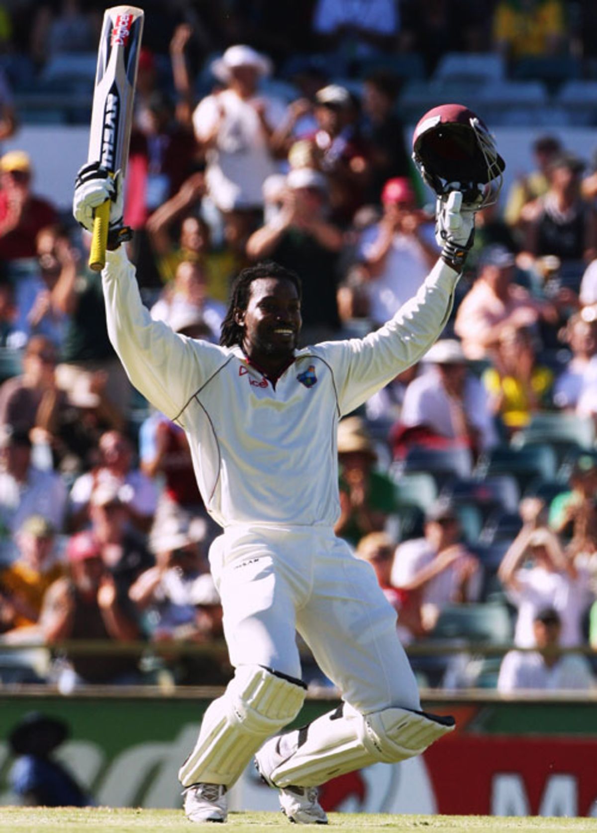 Chris Gayle celebrates his century | ESPNcricinfo.com