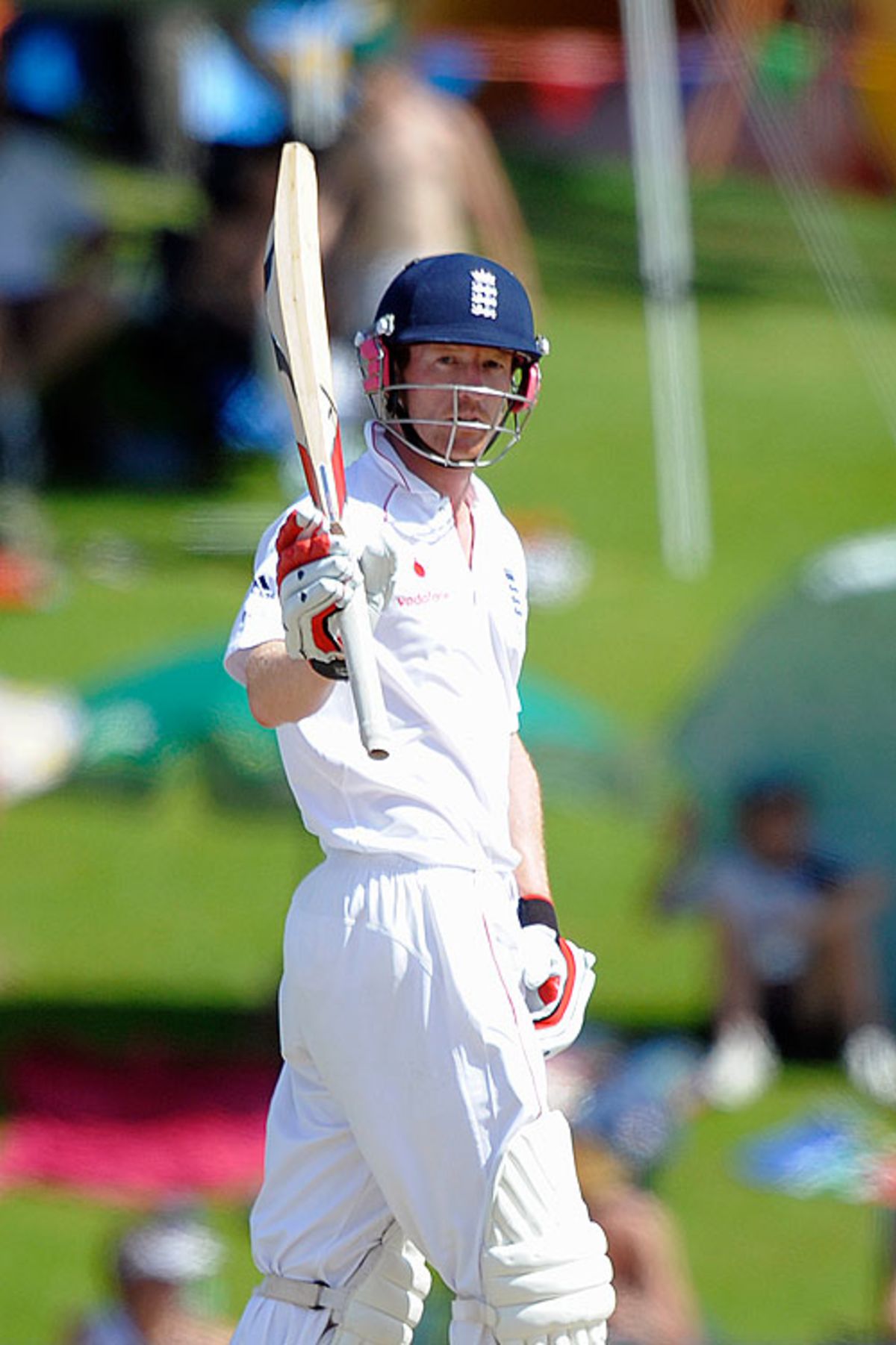 Paul Collingwood salutes the crowd after reaching his half-century ...