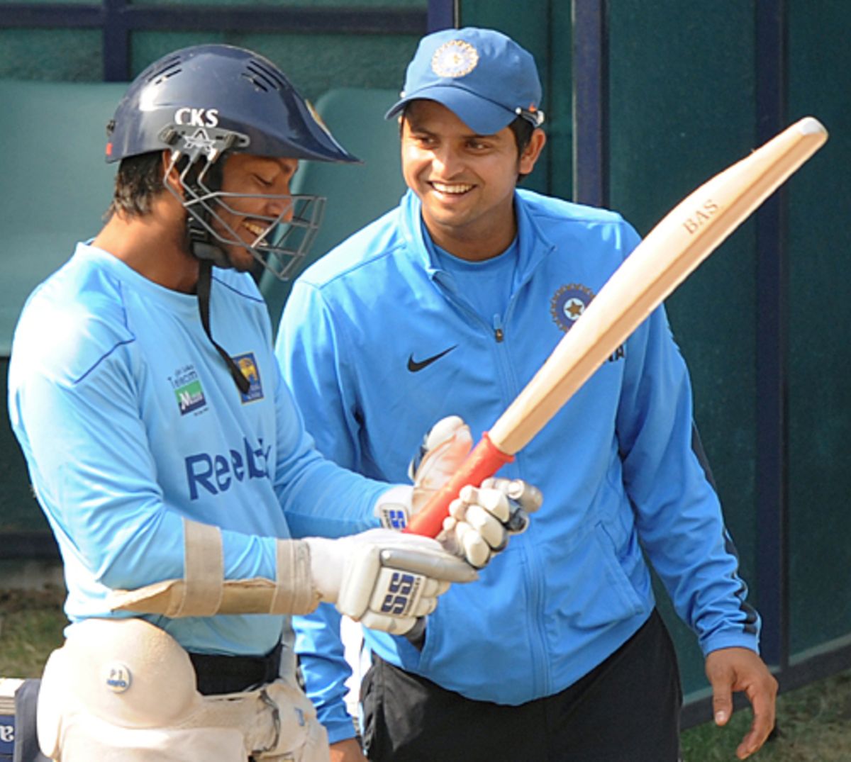 Kumar Sangakkara and Suresh Raina share a laugh | ESPNcricinfo.com