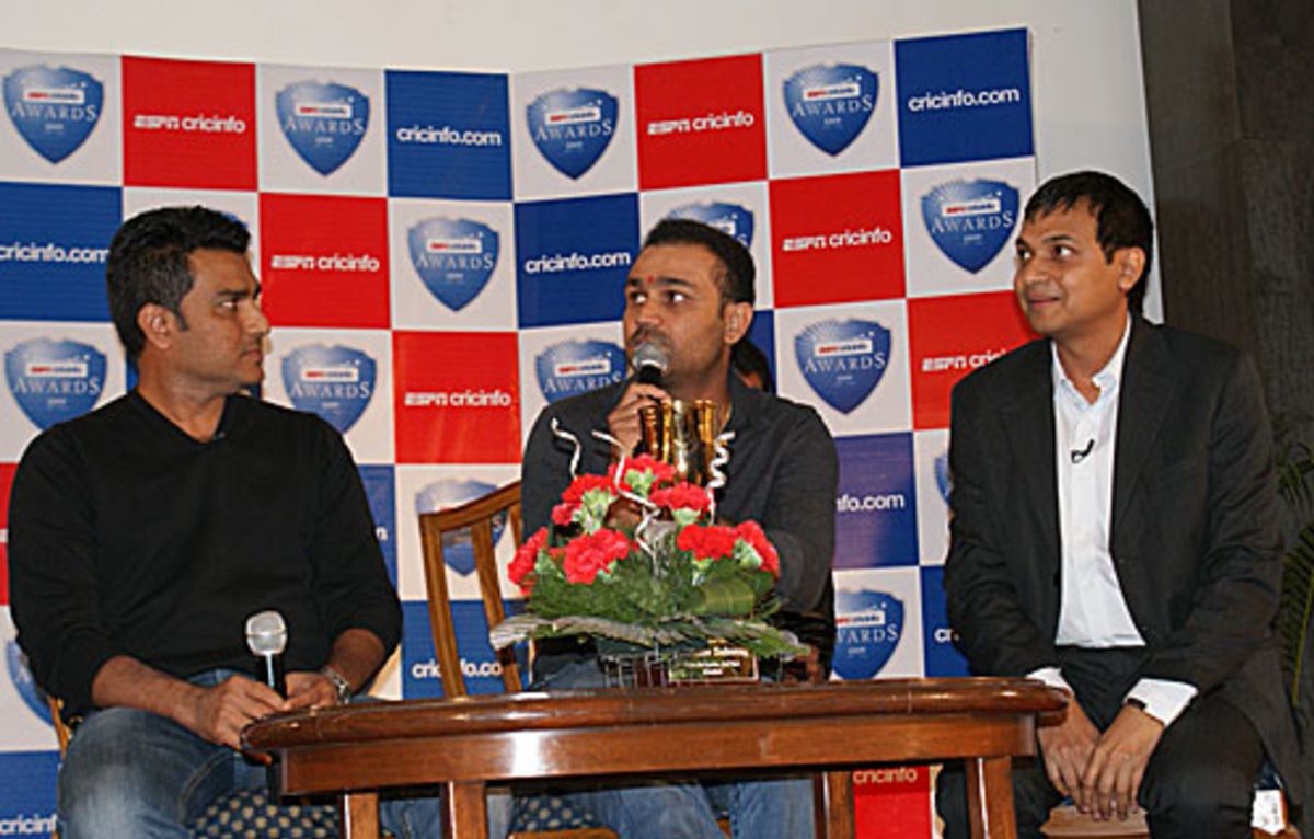 Virender Sehwag is flanked by Sanjay Manjrekar and Cricinfo editor ...
