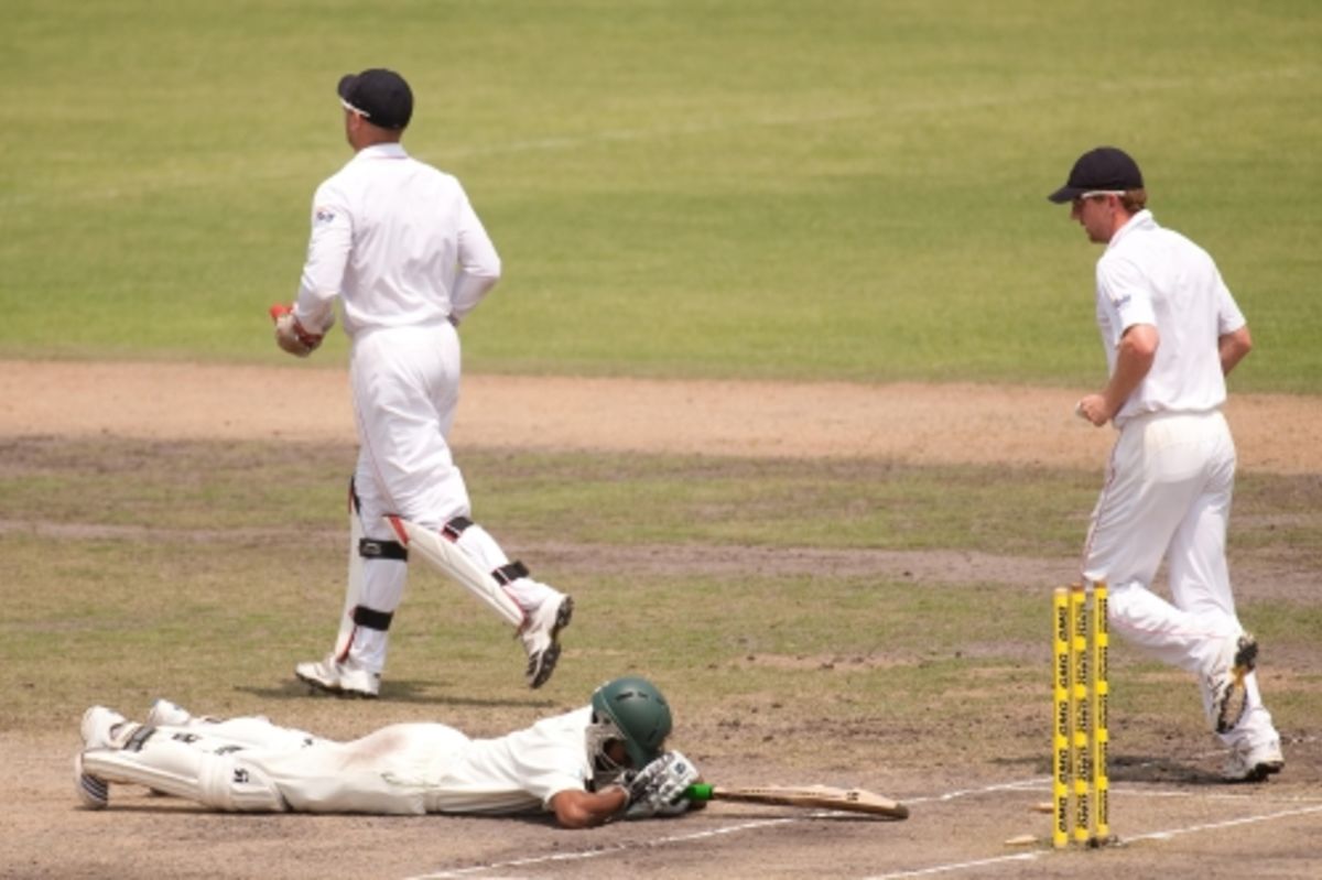 Shakib al Hasan cut a forlorn figure, lying on the pitch for several ...