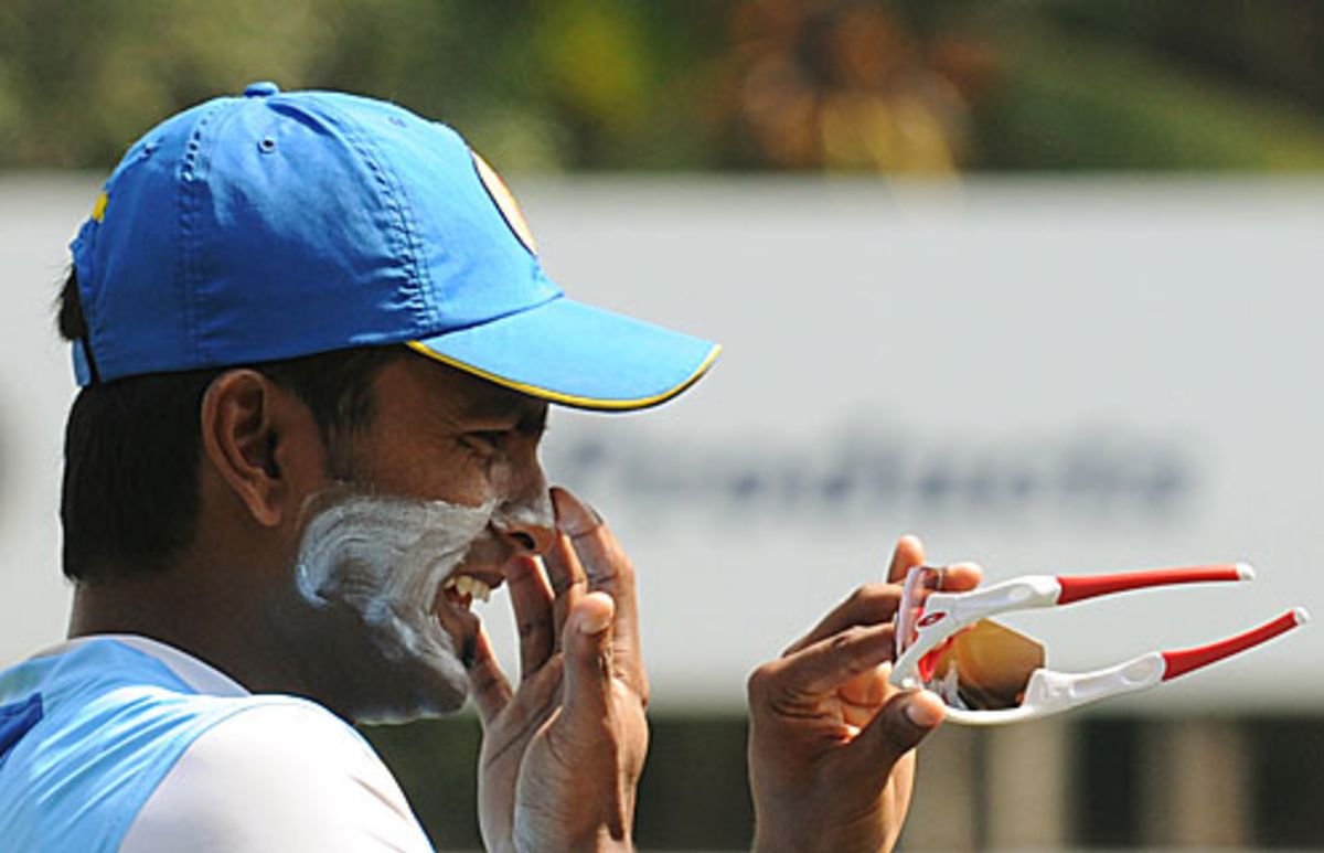 Chinthaka Jayasinghe takes a break during training | ESPNcricinfo.com