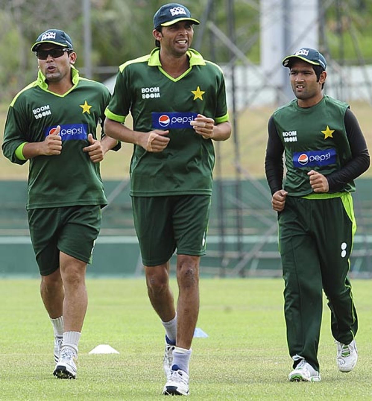 Kumar Sangakkara and coach Trevor Bayliss walk out for practice ...