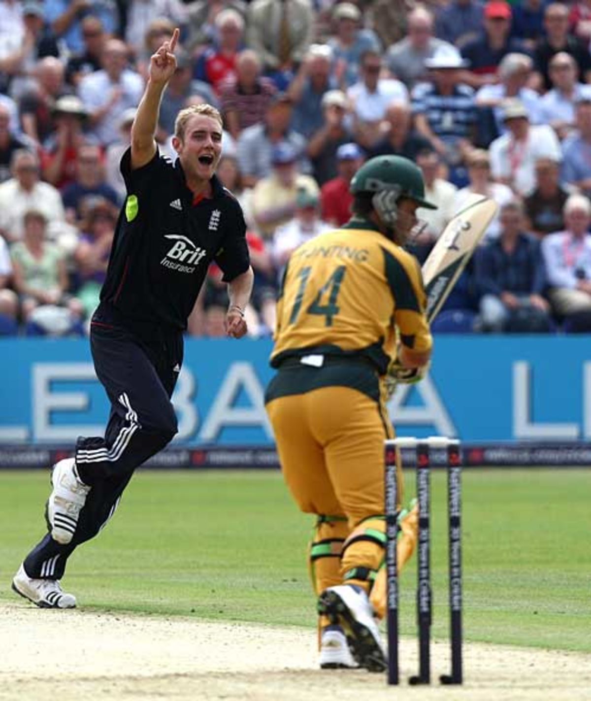 Graeme Swann sits behind the boundary as a free hit is taken ...
