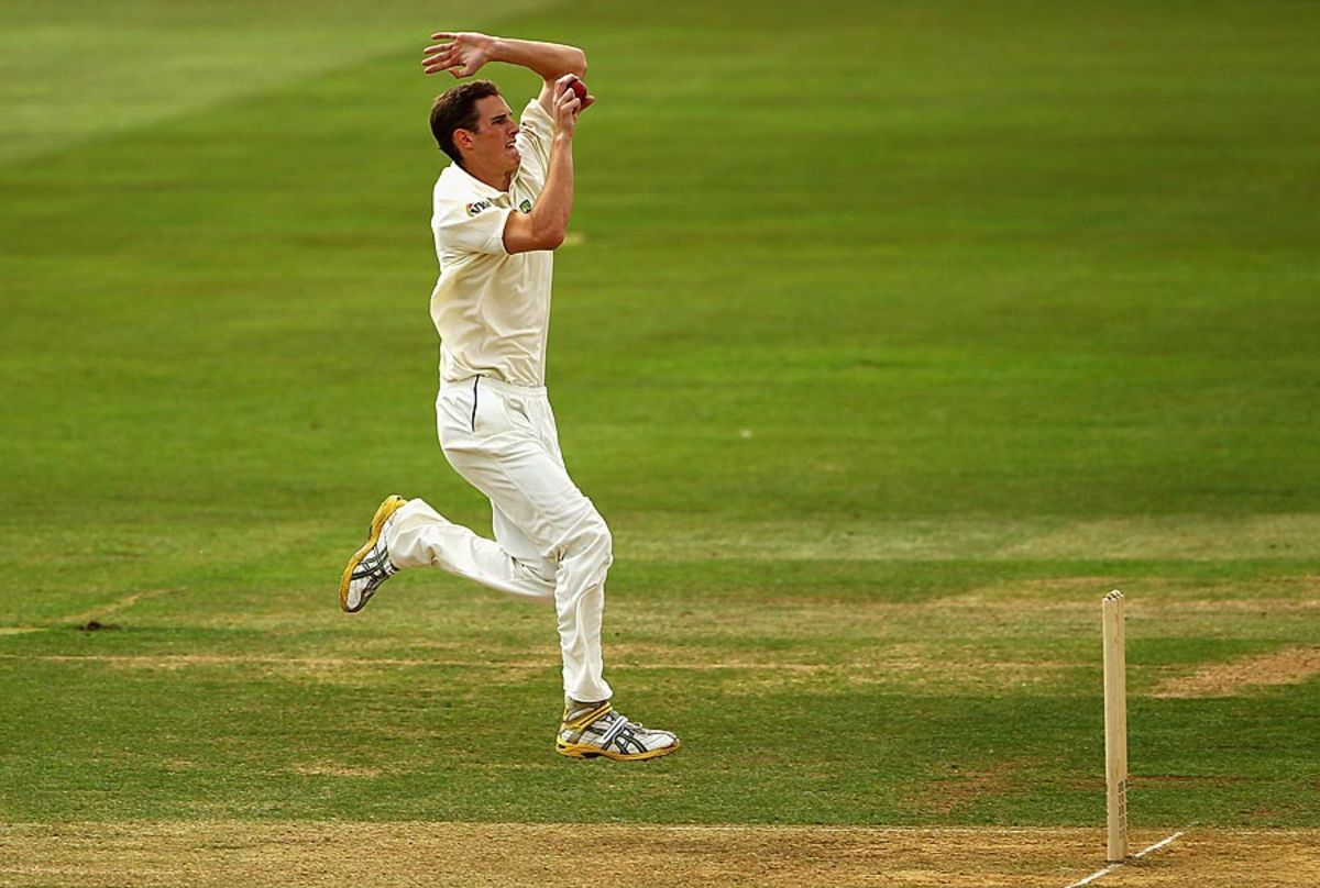 Peter George runs in to bowl | ESPNcricinfo.com