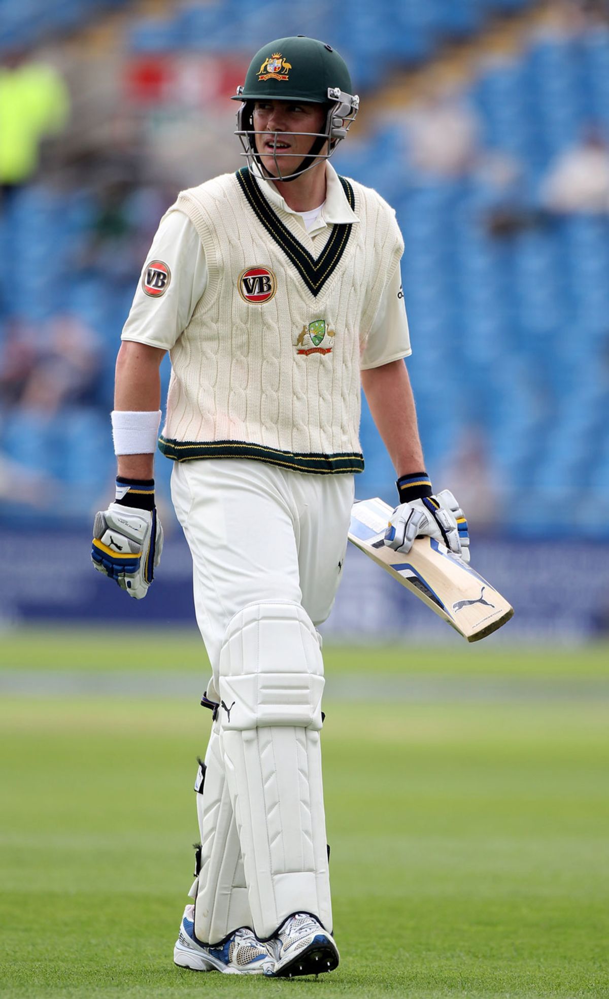 Umar Amin is engulfed by his team-mates after claiming Marcus North as ...