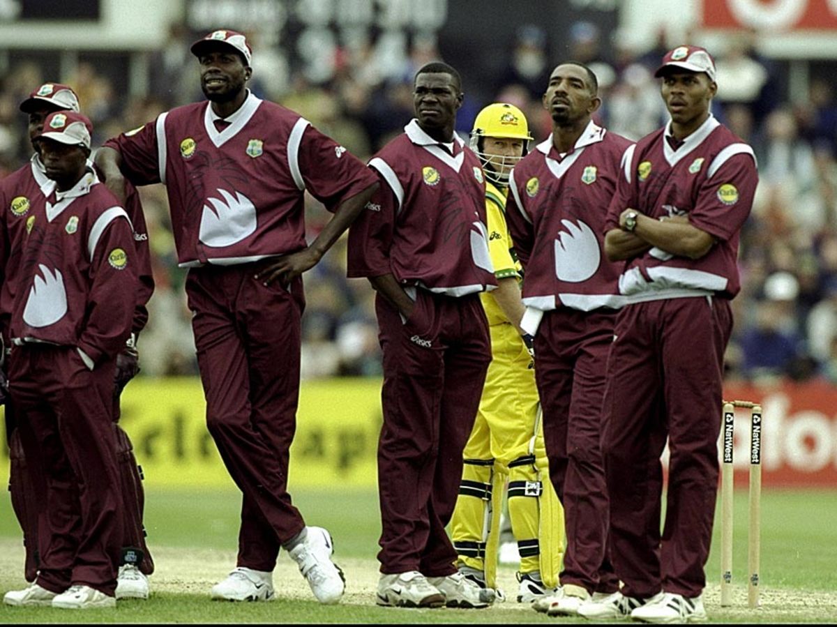 Steve Waugh and the West Indies team wait for the umpire's decision ...