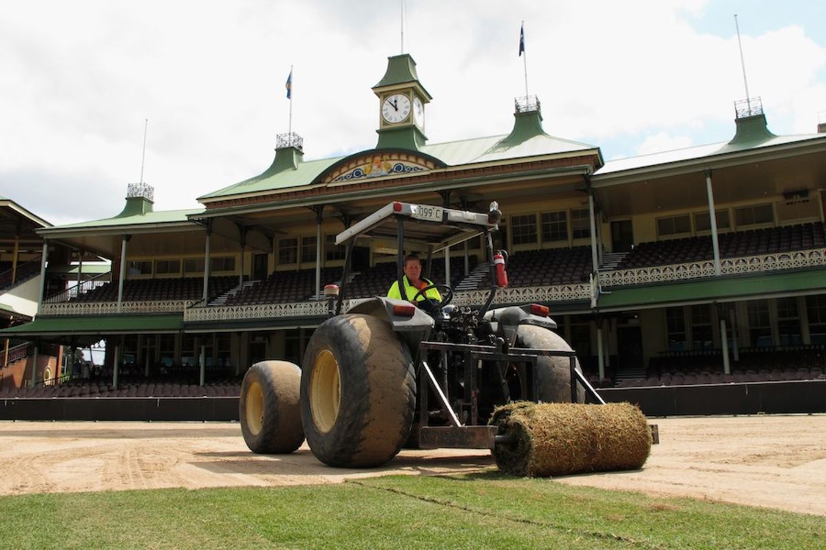 A groundsman lays new turf at the SCG | ESPNcricinfo.com