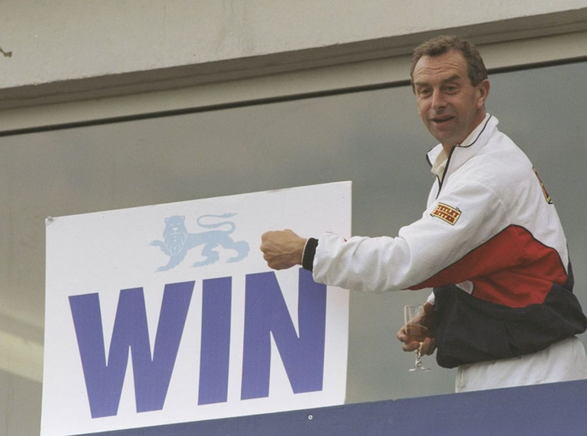 David Lloyd, the new coach, points to a "Win" board | ESPNcricinfo.com