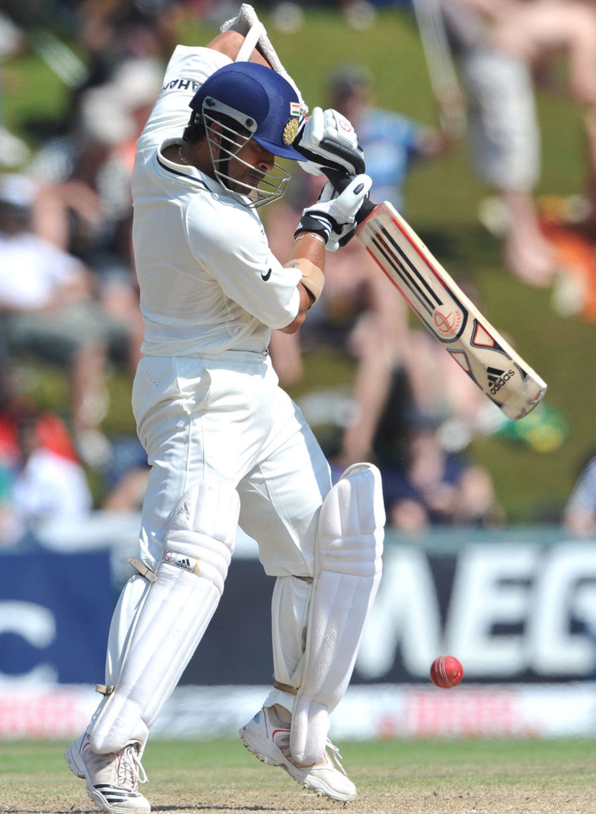 Sachin Tendulkar plays a shot off the back foot during his century ...