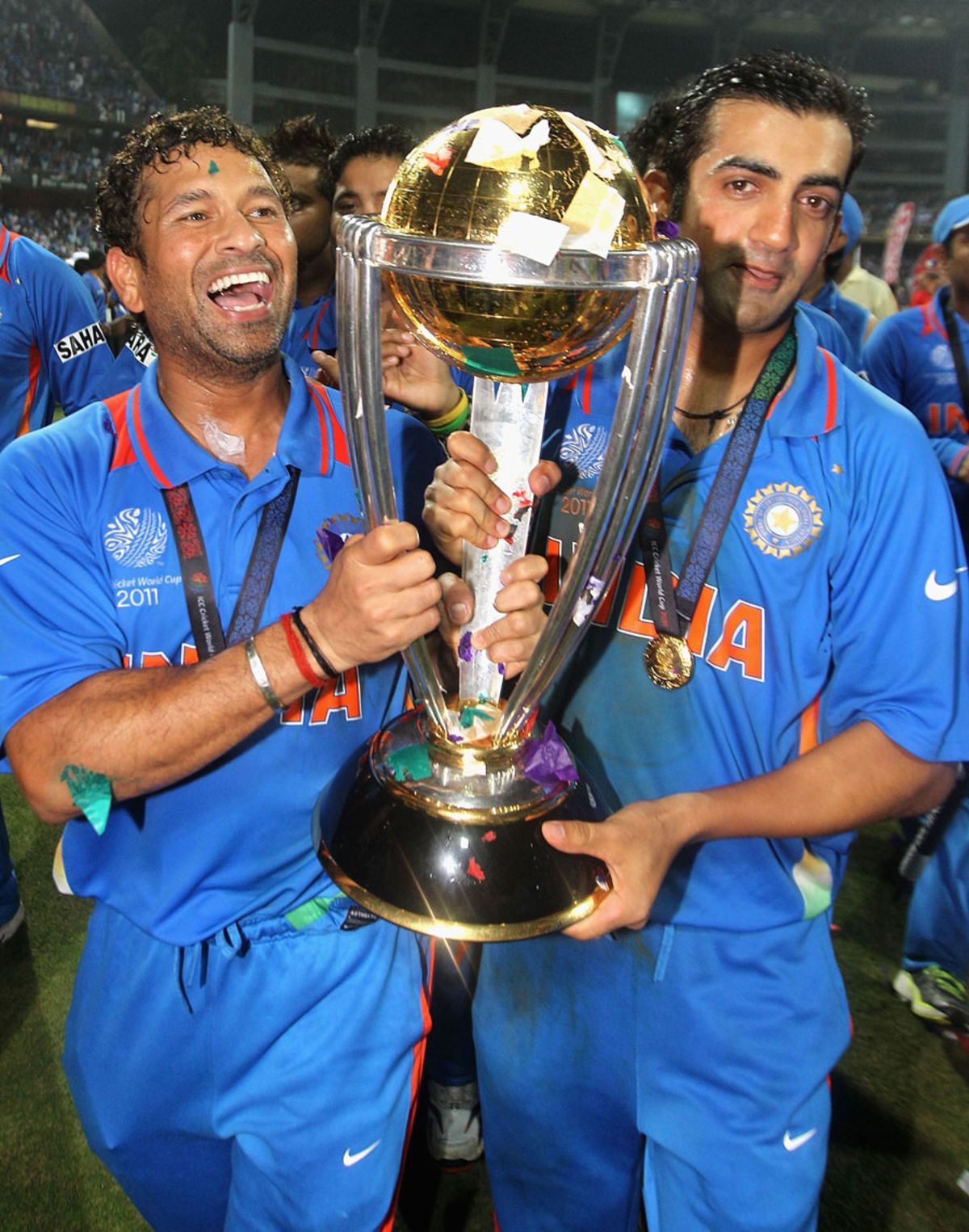 Sachin Tendulkar and Gautam Gambhir walk with the trophy | ESPNcricinfo.com