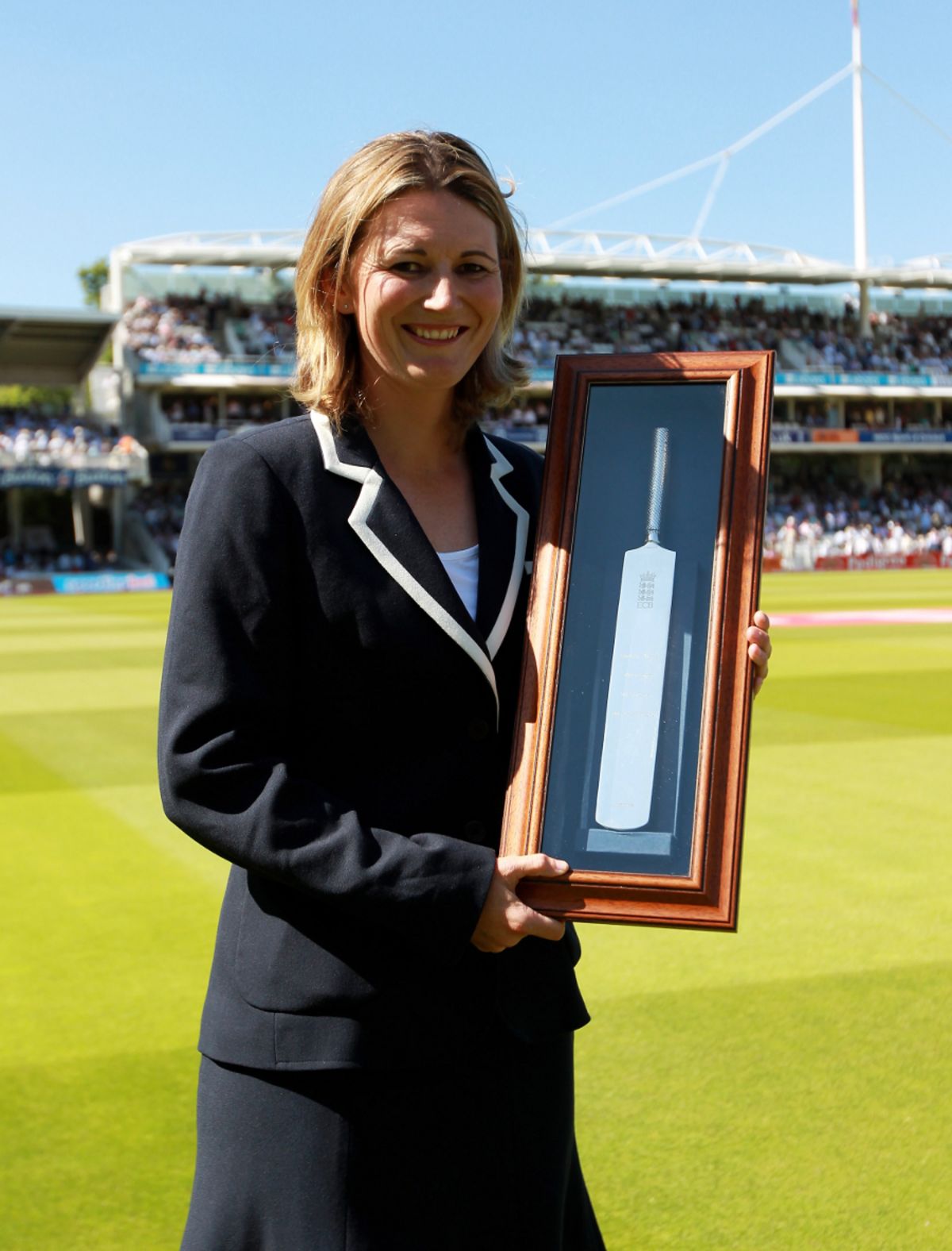England captain Charlotte Edwards was presented with an engraved silver ...
