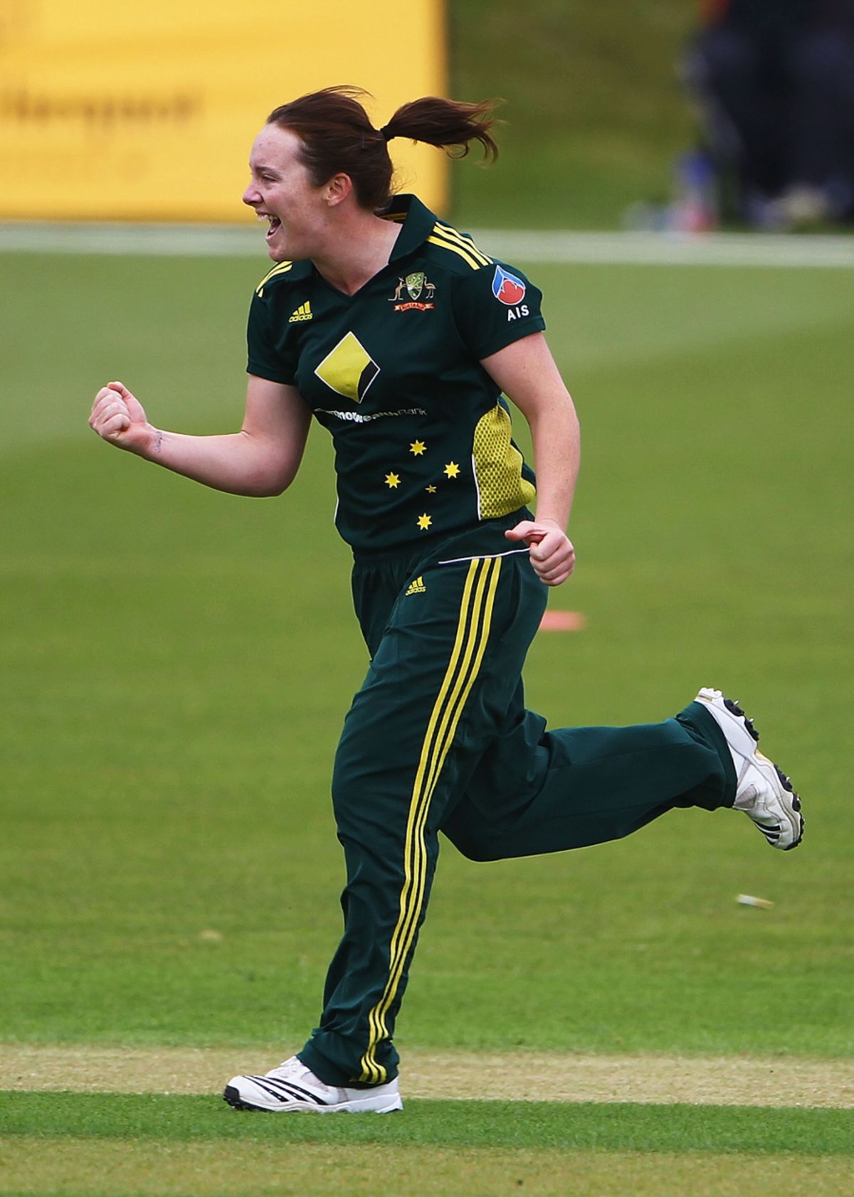 Sarah Coyte in mid-air | ESPNcricinfo.com