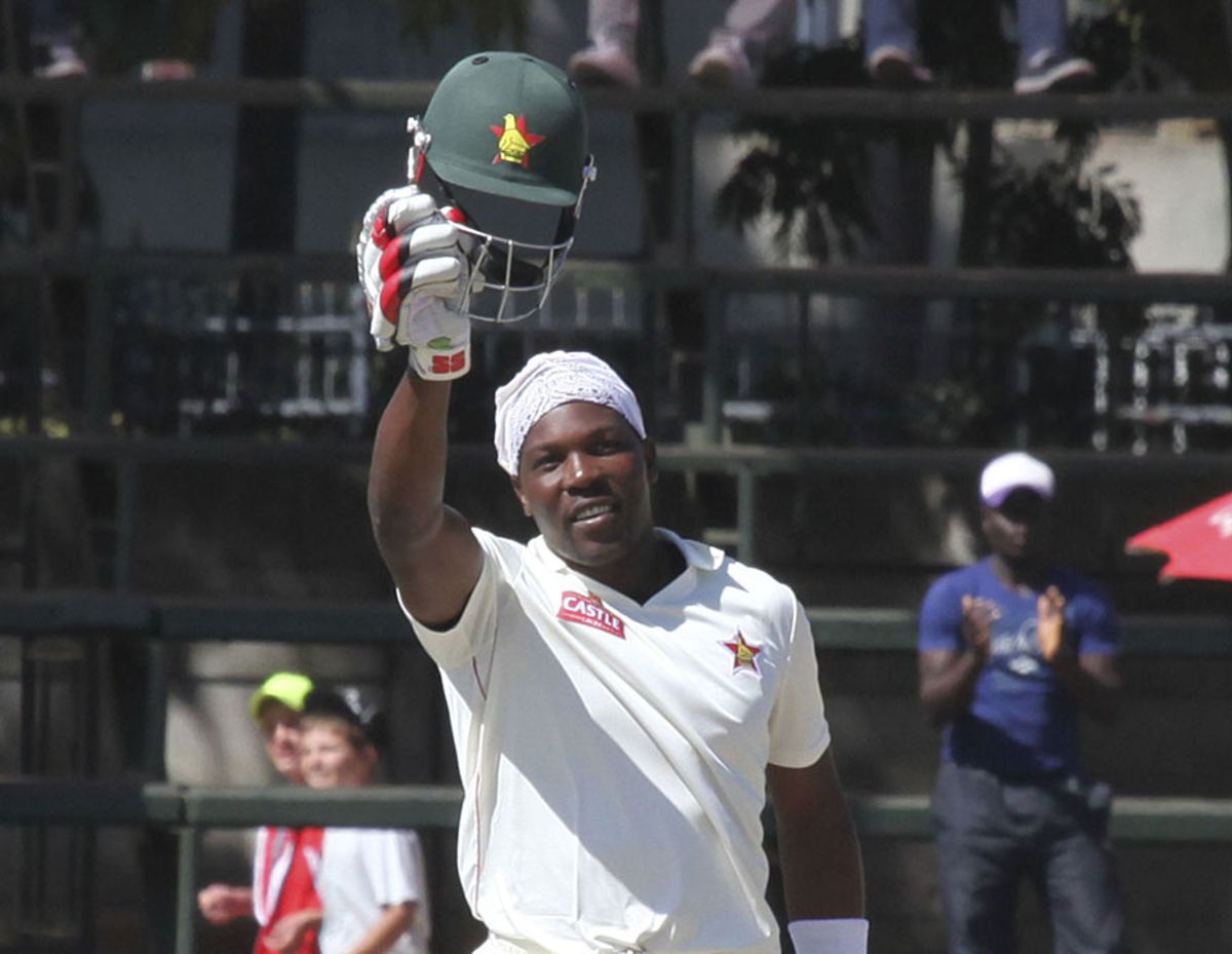 Hamilton Masakadza celebrates after reaching his century | ESPNcricinfo.com