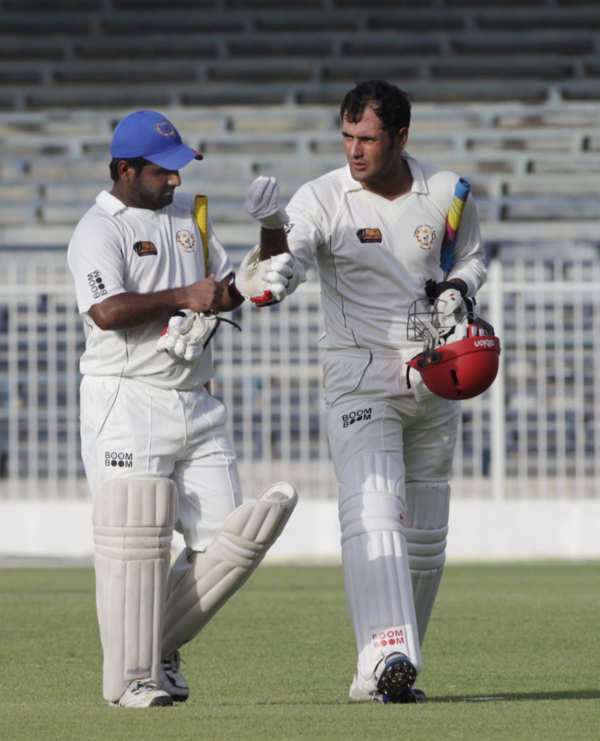 Mohammad Shahzad and Mohammad Nabi leave the field | ESPNcricinfo.com