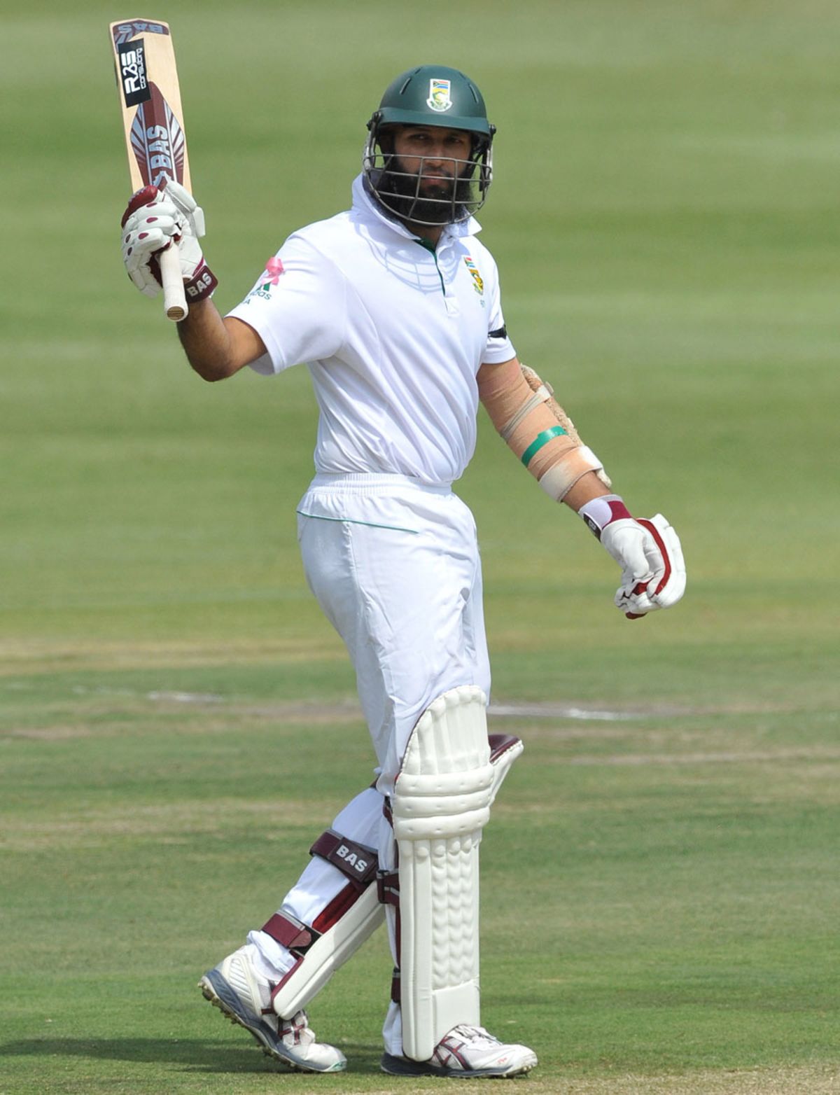 Hashim Amla raises his bat after reaching a half-century | ESPNcricinfo.com
