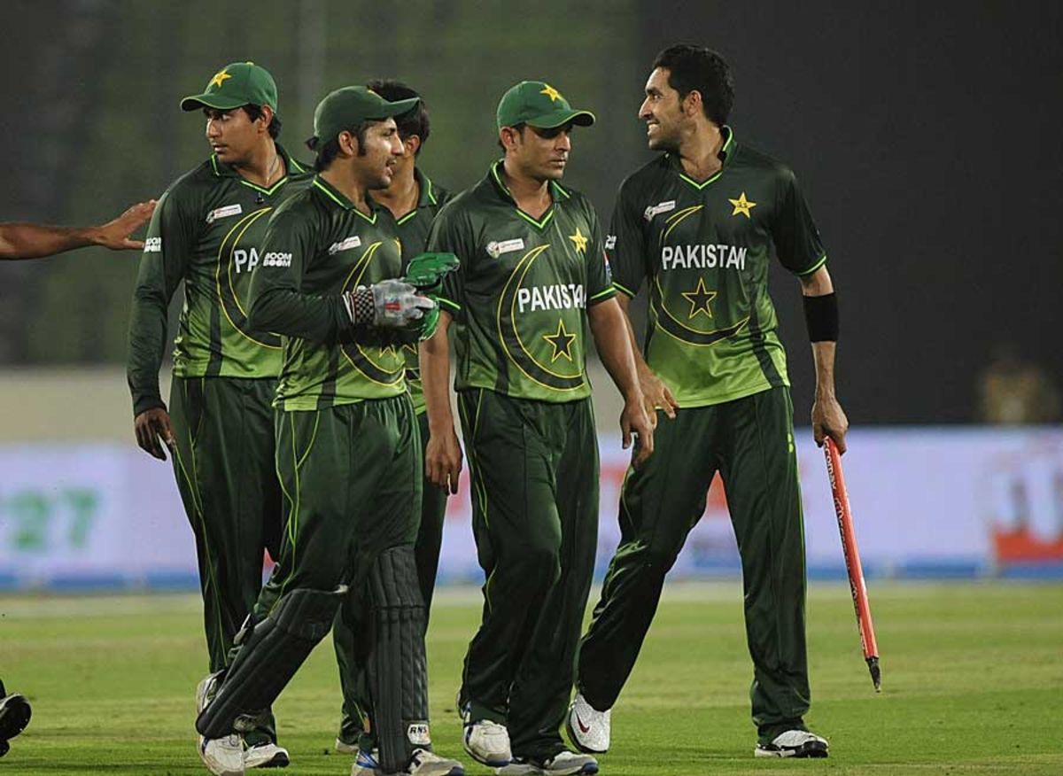 Pakistan players walk back after securing victory | ESPNcricinfo.com