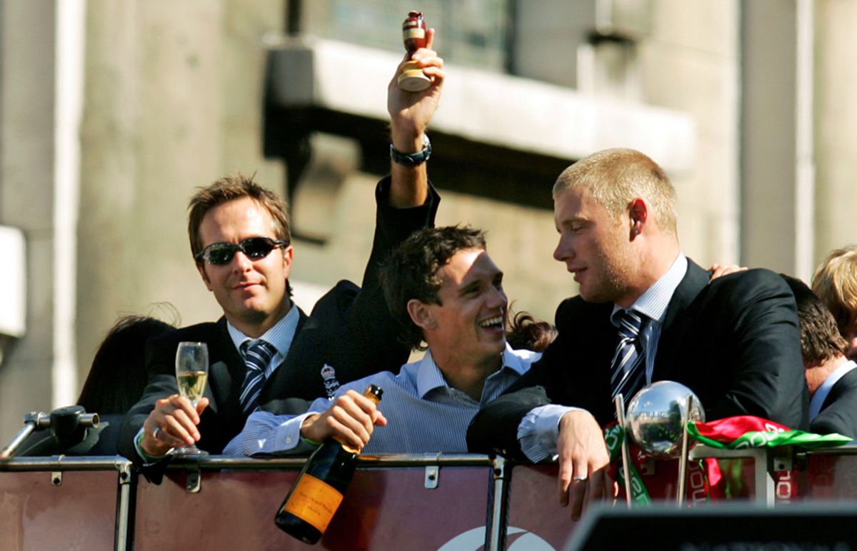 Michael Vaughan, Gary Pratt and Andrew Flintoff ride on top of the bus ...