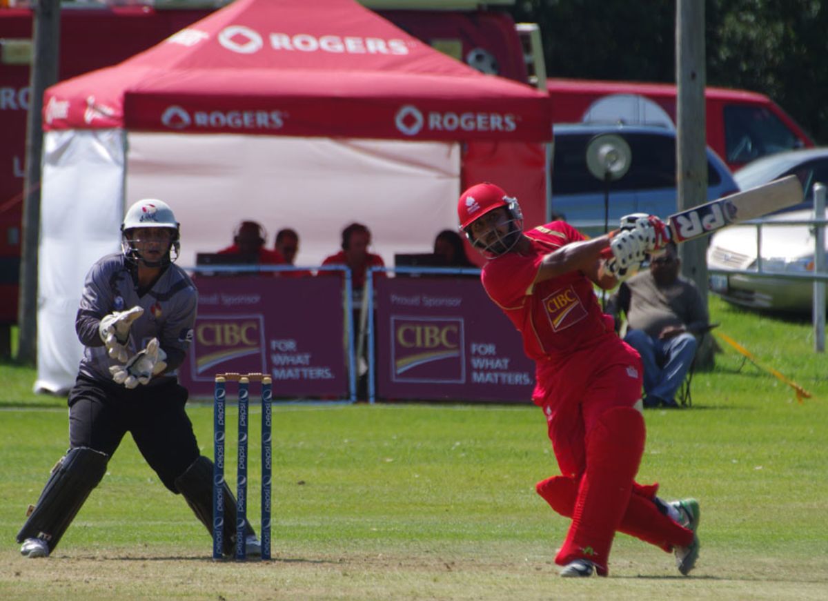 Hiral Patel lofts the ball during his half-century | ESPNcricinfo.com