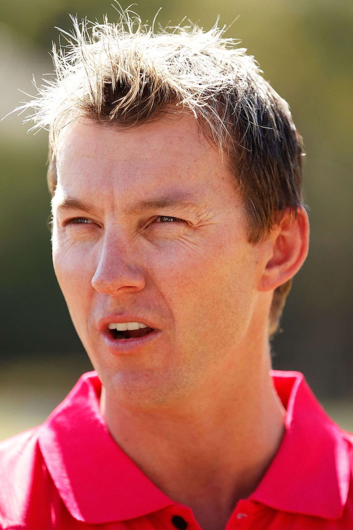 Brett Lee, Greg Chappell and Gurinder Sandhu pose with kids at a ...