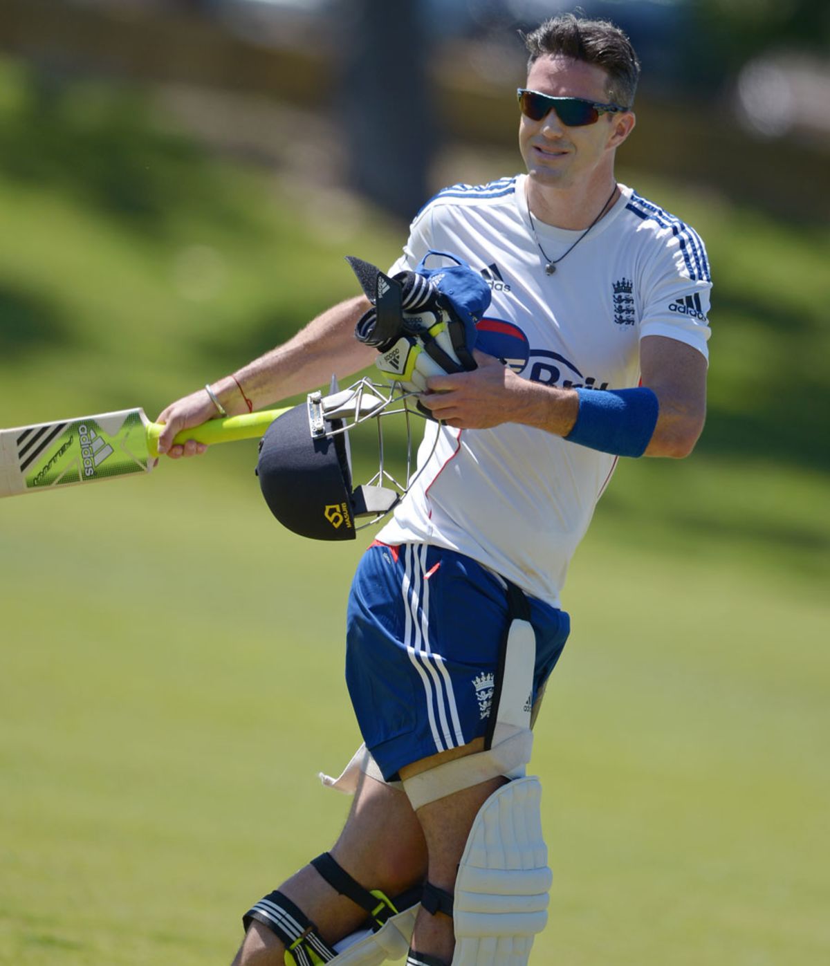 Kevin Pietersen does some stretching ahead of a nets session ...