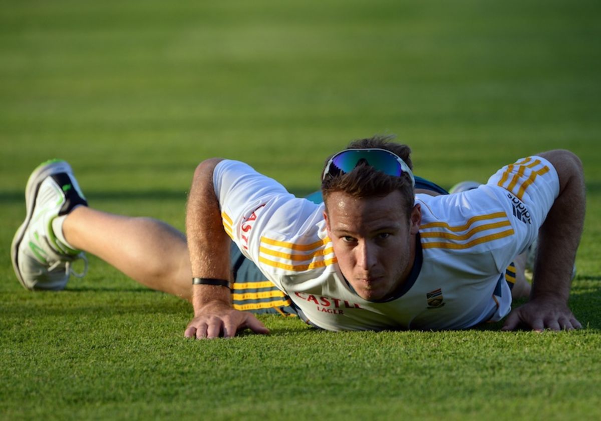 David Miller looks on while exercising during a training session ...