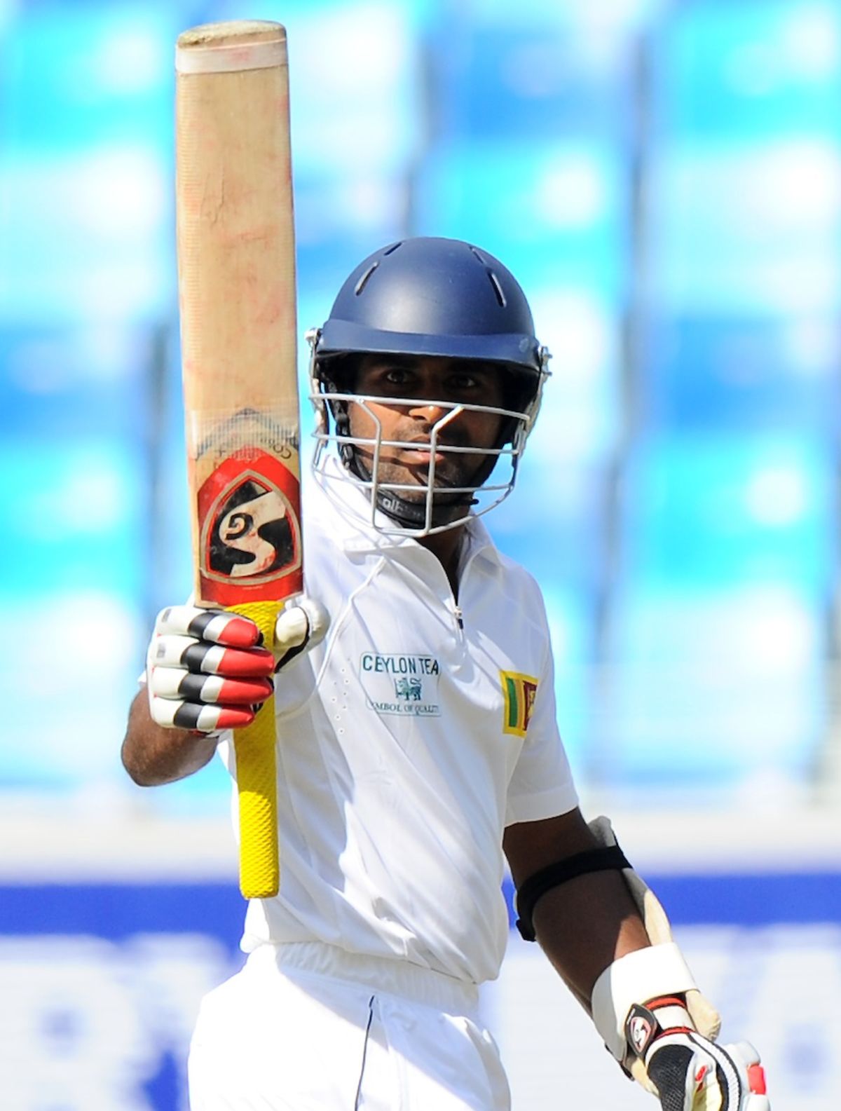 Kaushal Silva raises his bat for a half-century | ESPNcricinfo.com