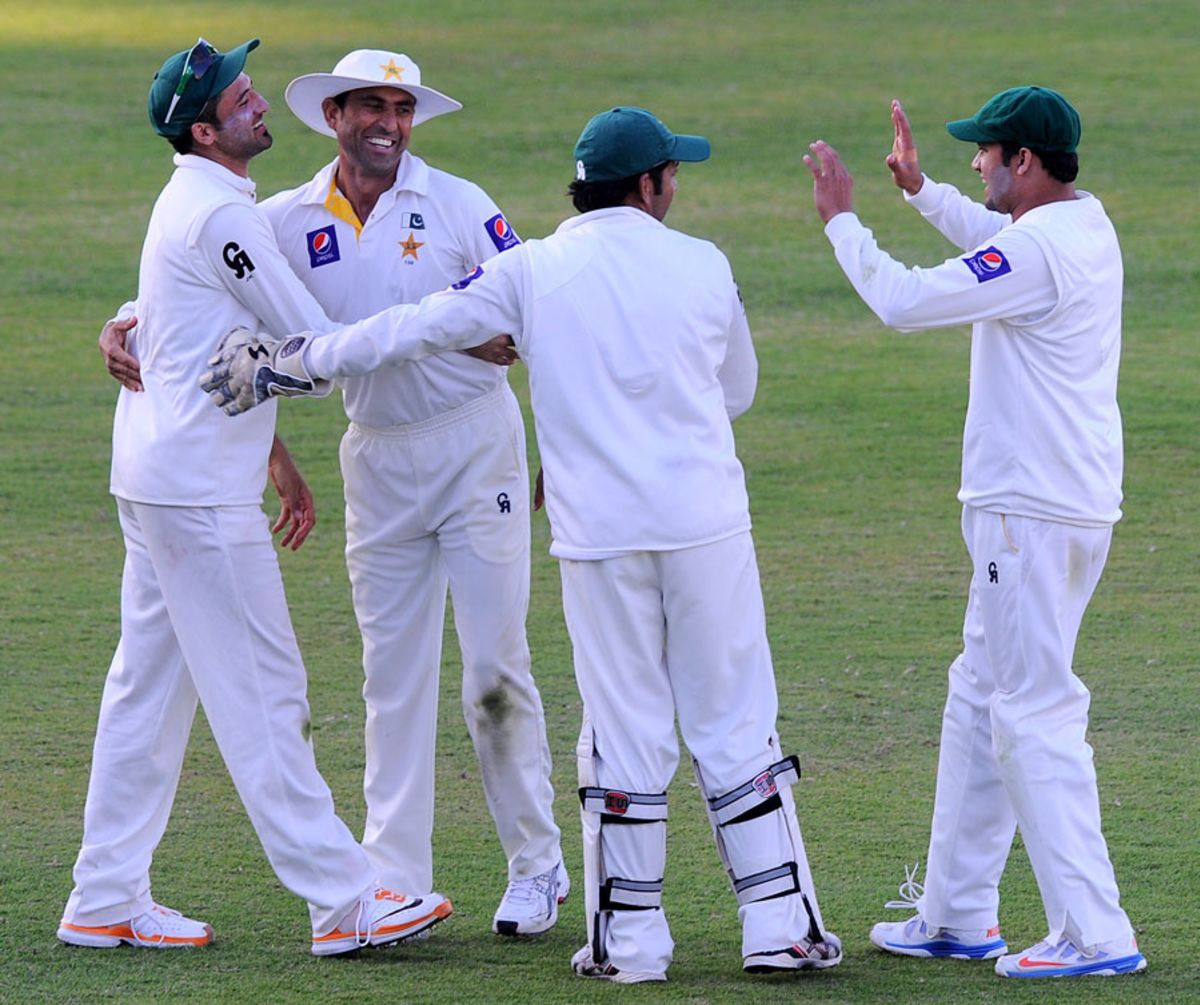 The Pakistan fielders celebrate Dilruwan Perera's dismissal ...