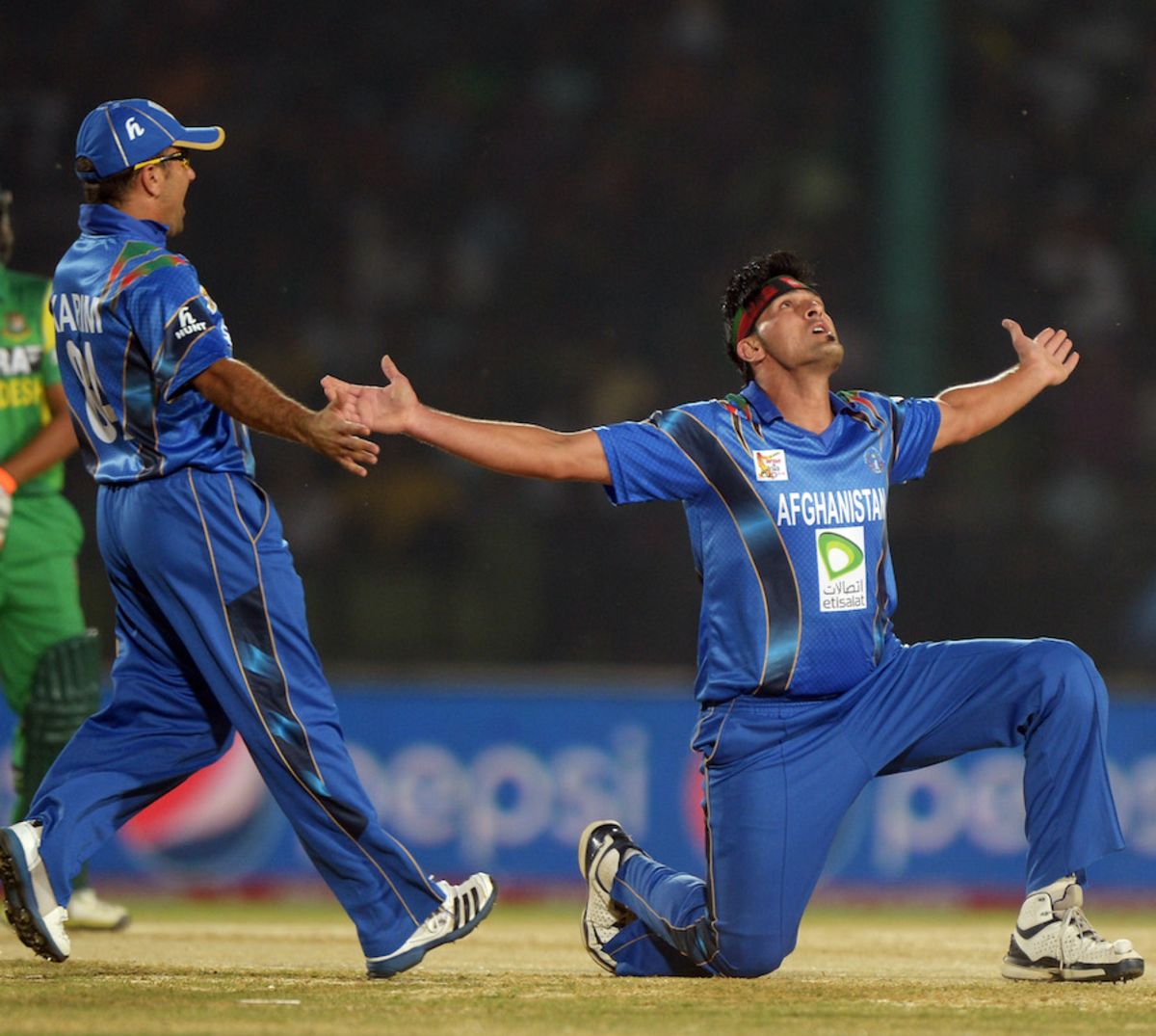 Hamid Hassan celebrates the wicket of Anamul Haque | ESPNcricinfo.com