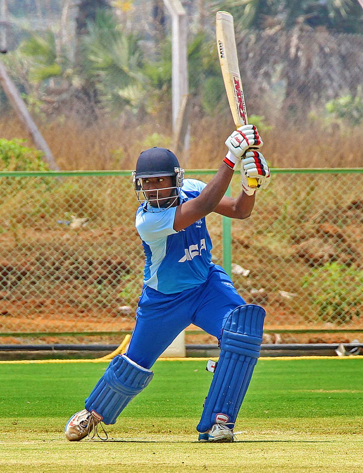 Prasanth Kumar drives during his unbeaten 33 | ESPNcricinfo.com